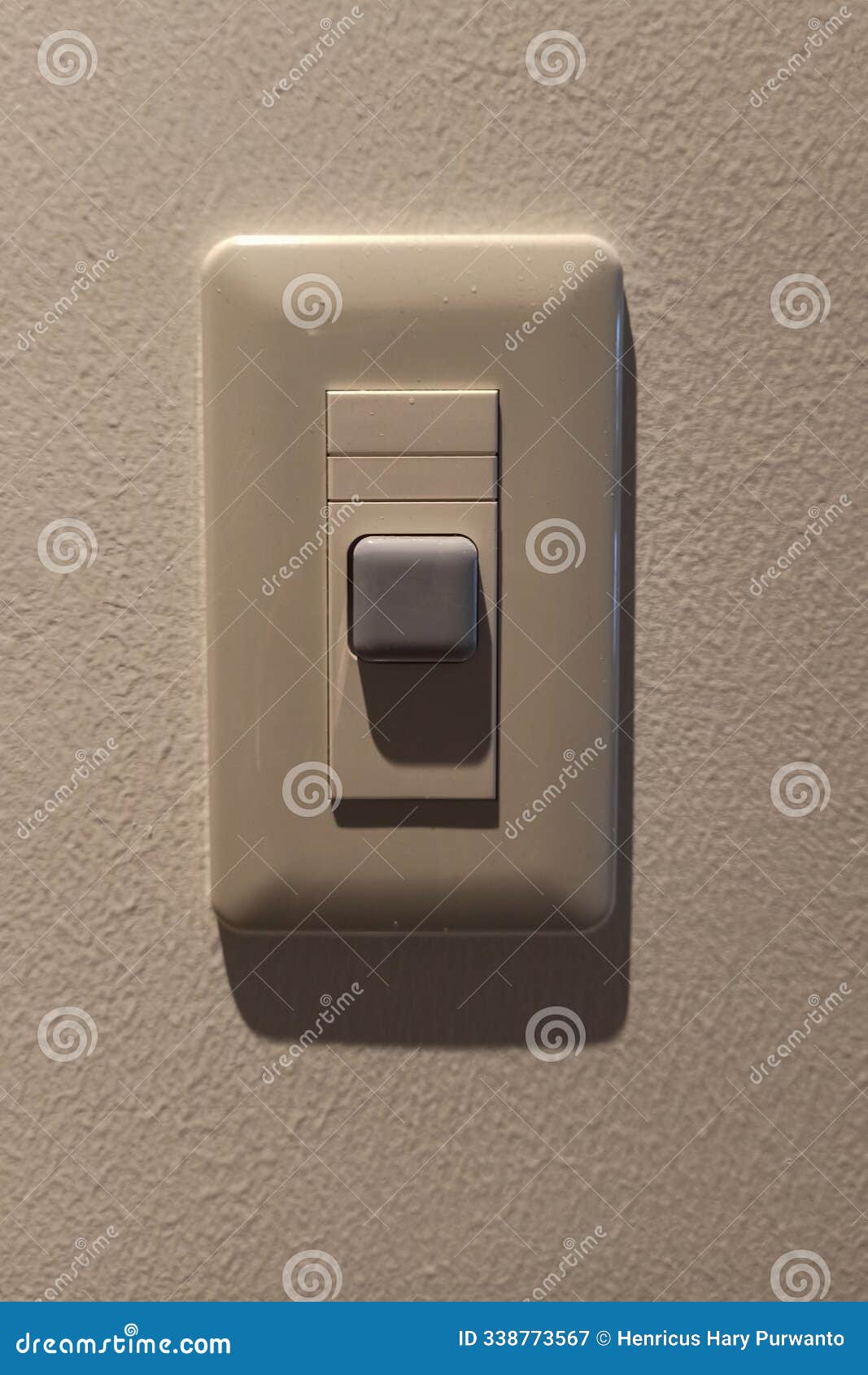 A Brown Square Light Switch is Attached To the Wall Stock Image - Image ...