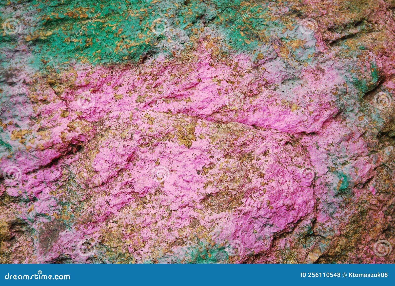 Brown Stone Painted with Paint in Pink and Green. Rock Background ...