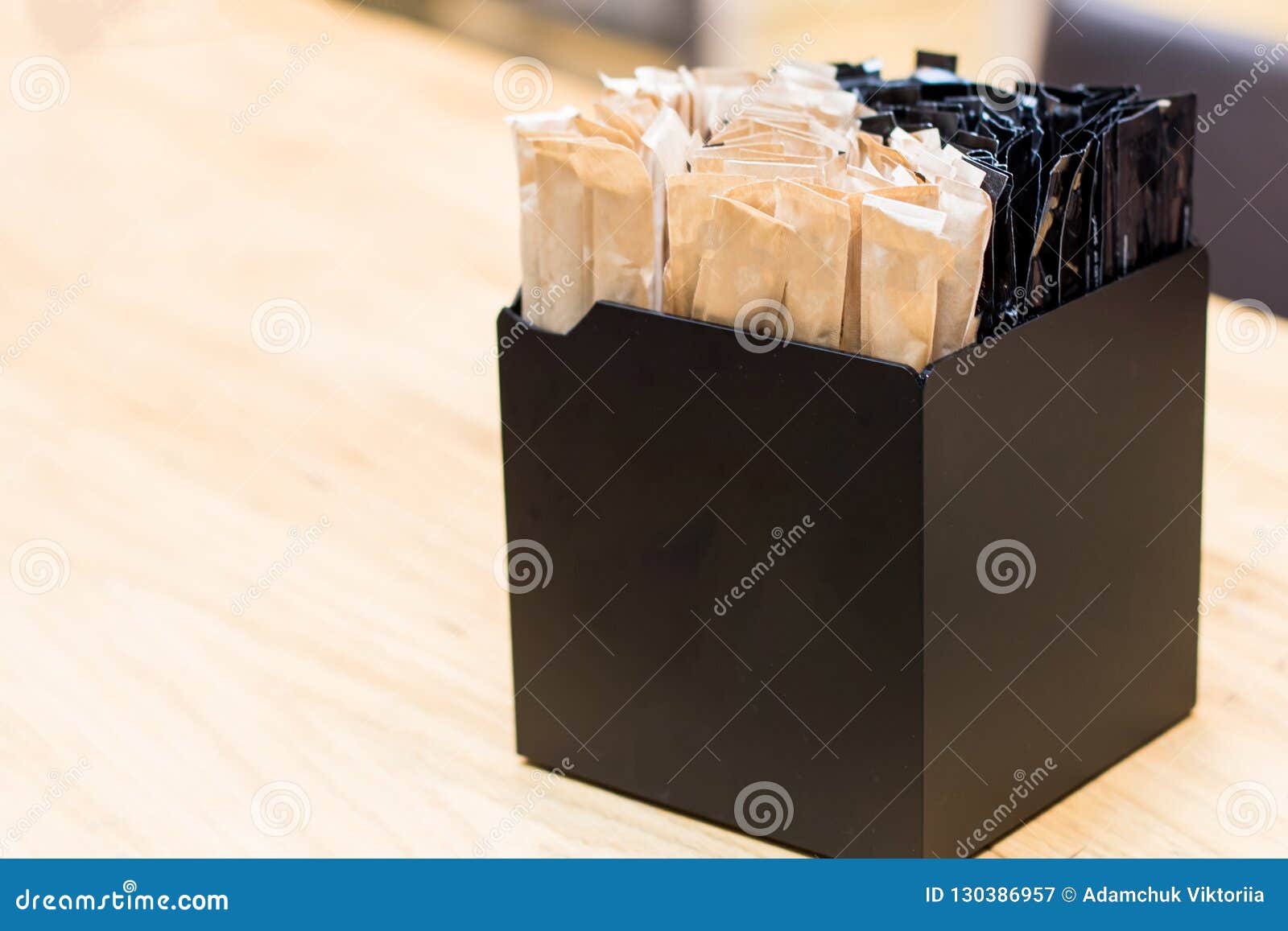 Brown Sugar Sachets in Black Box on a Counter at a Cafe Stock Image ...
