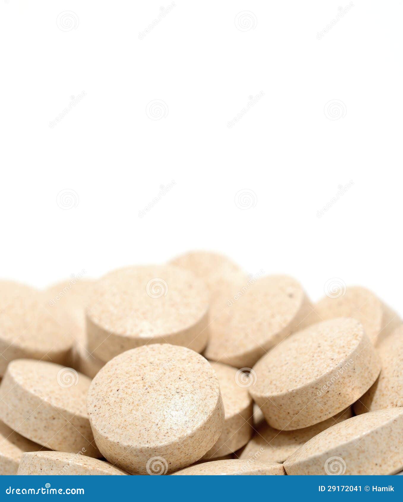 Brown Tablets Falling Out Of An Open Package On A Dark Mirror ...