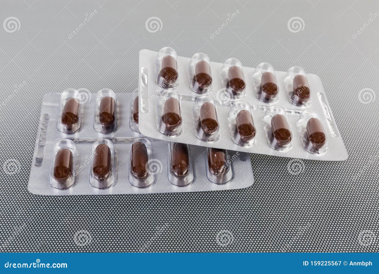 Brown Tablets of Dietary Supplements in Blister Packs Close-up Stock ...