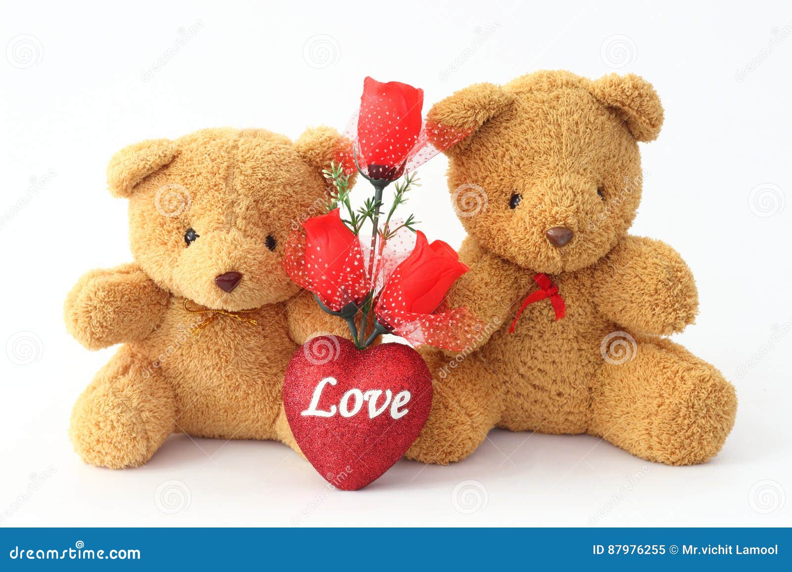 Brown Teddy Bear Holding Two Roses Stock Image - Image of rose, little ...