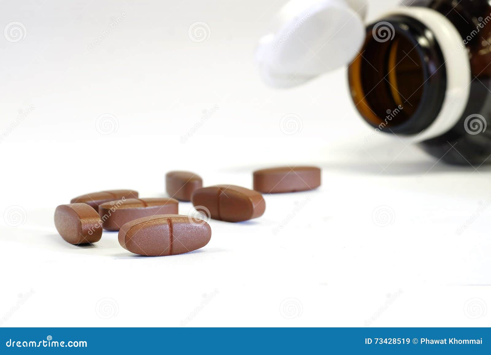 Brown vitamin tablets stock image. Image of strain, nutritional - 73428519