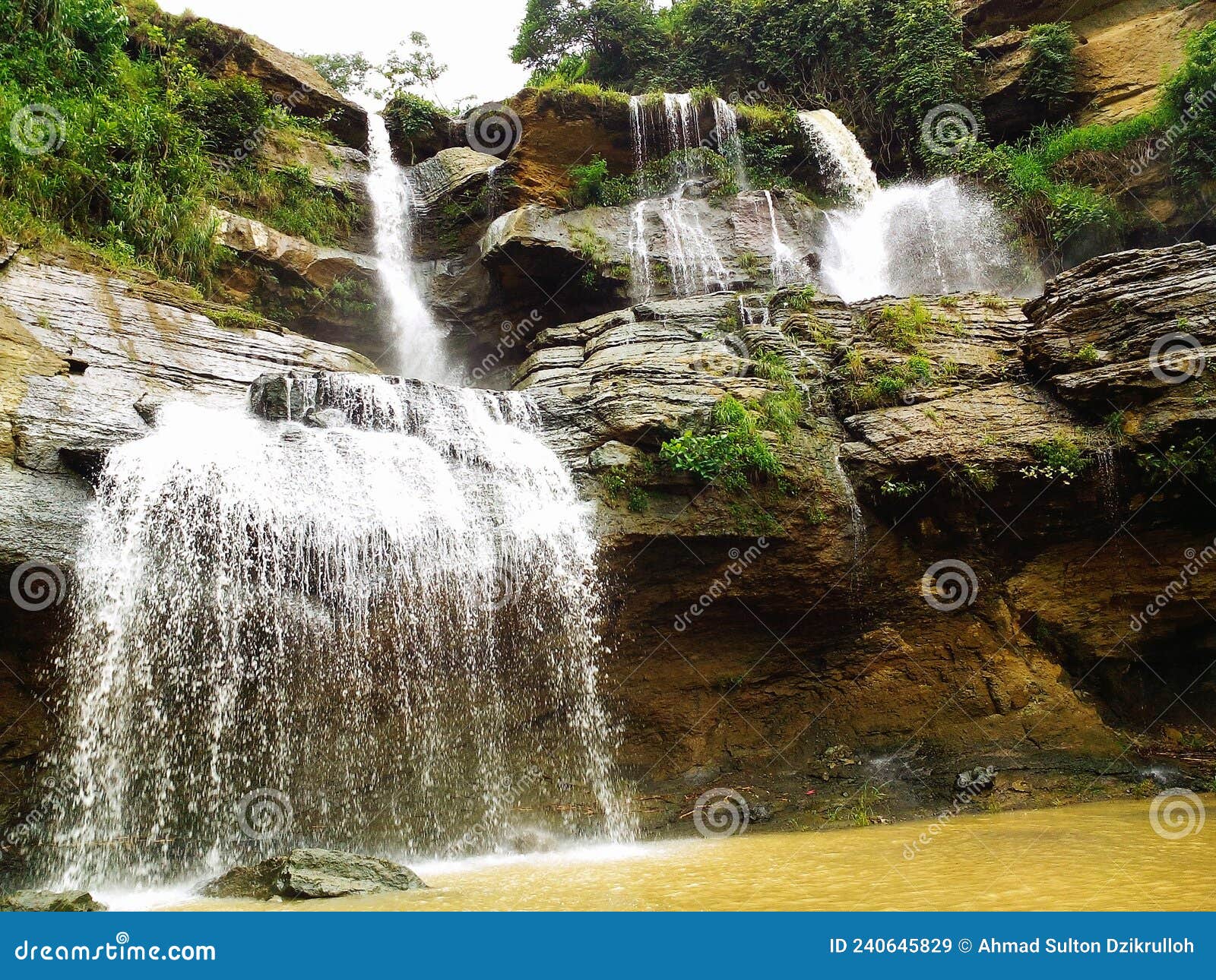 Brown water waterfall stock image. Image of watercourse - 240645829