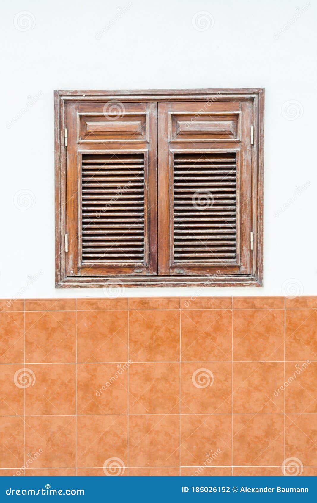 A Brown Window Shutter on a White Facade Stock Photo - Image of brown ...