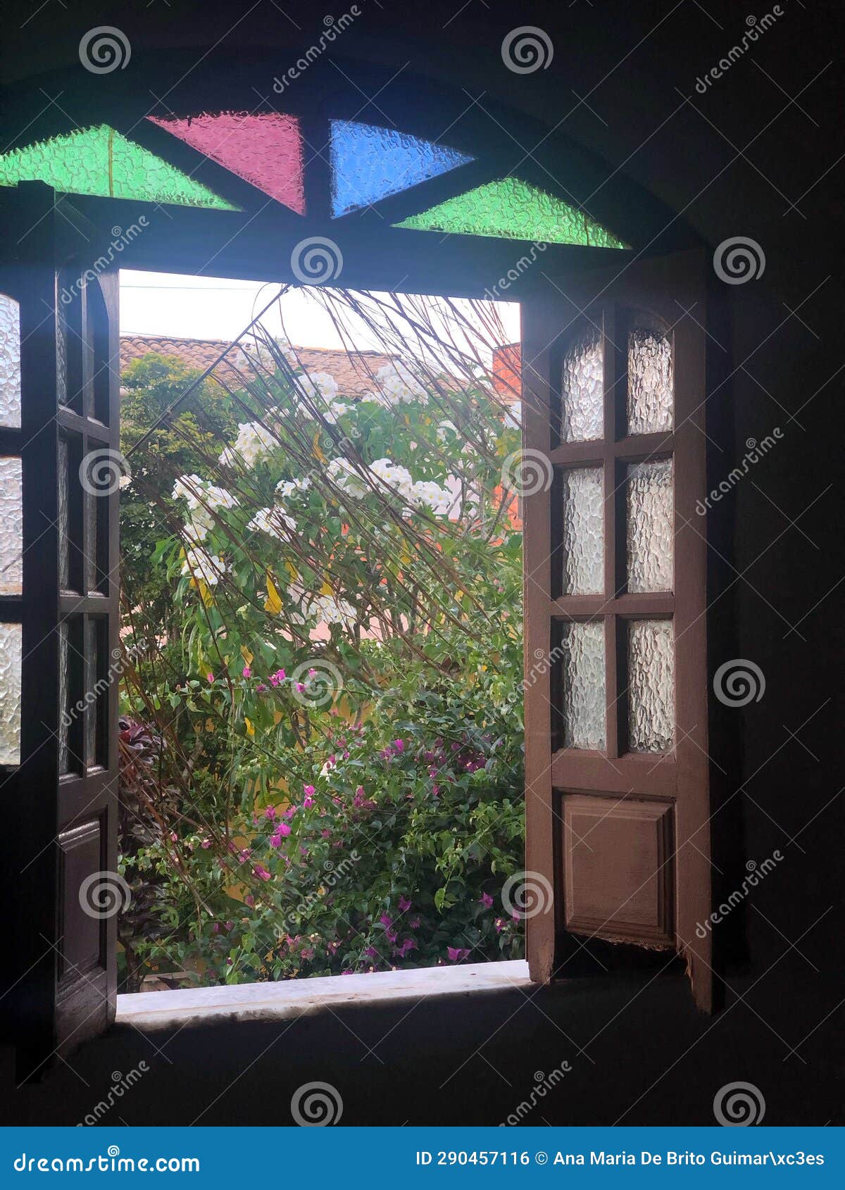 Brown Window with Tinted Glass Overlooking Another Window Stock Photo ...