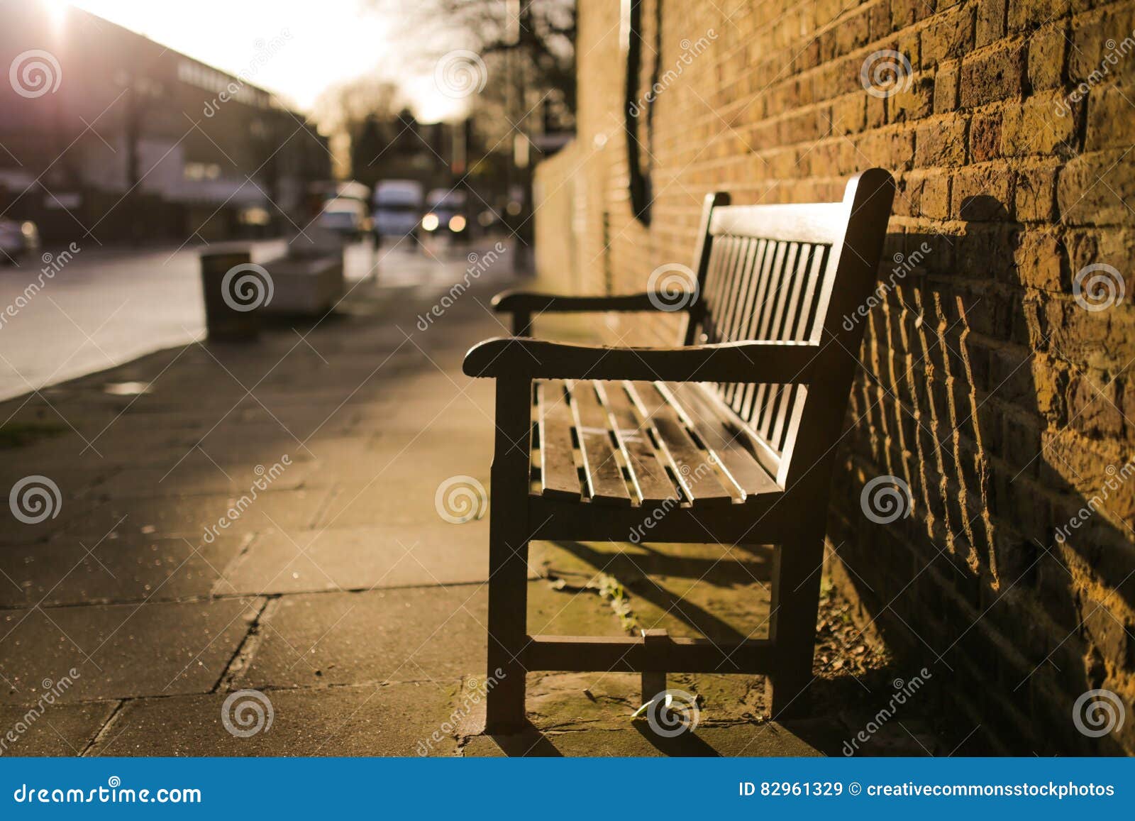 Brown Wooden Bench On The Side Of The Road Picture. Image: 82961329