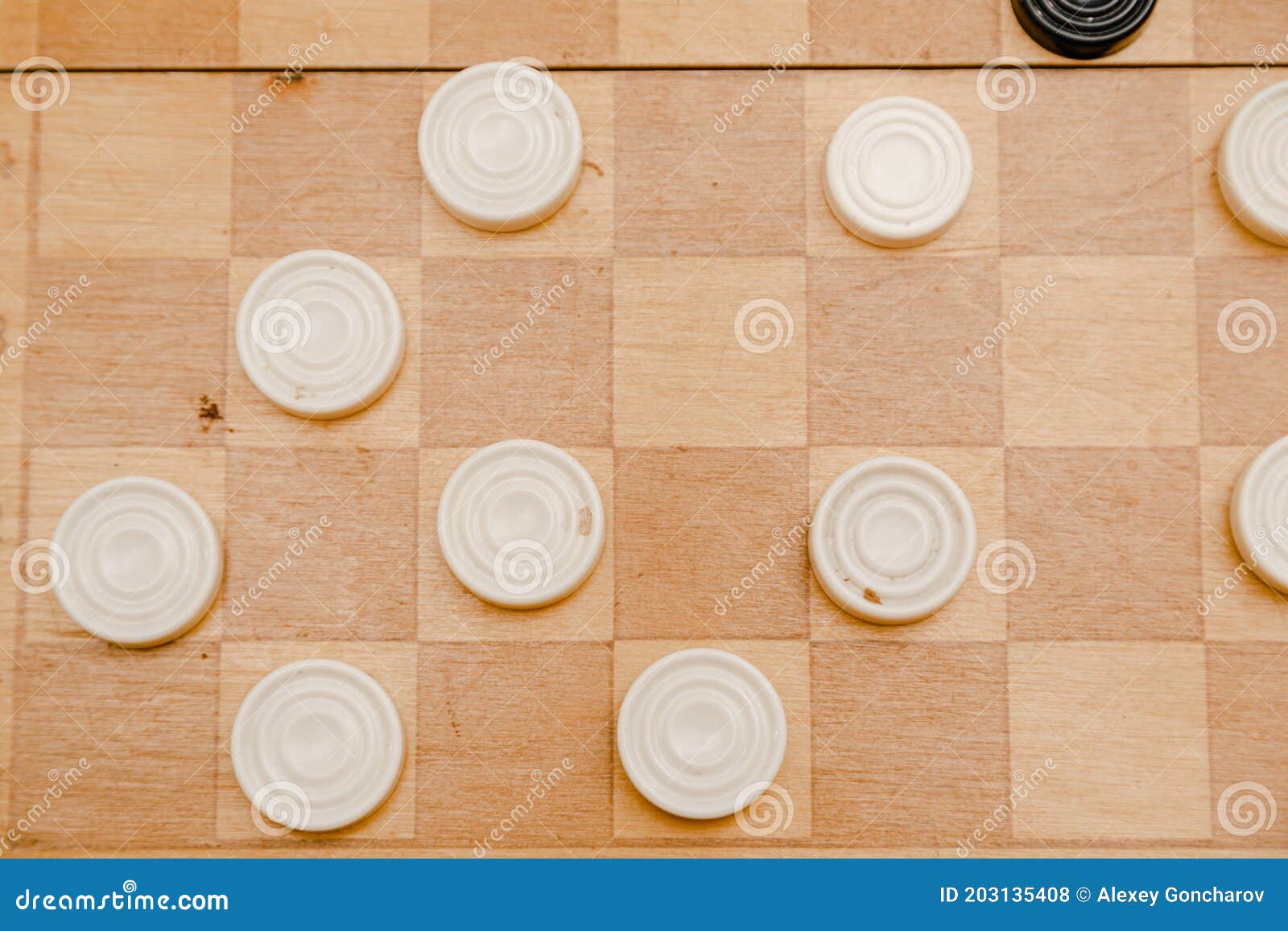Brown Wooden Chessboard with Classic Checkers. Table Game. Checkers on ...