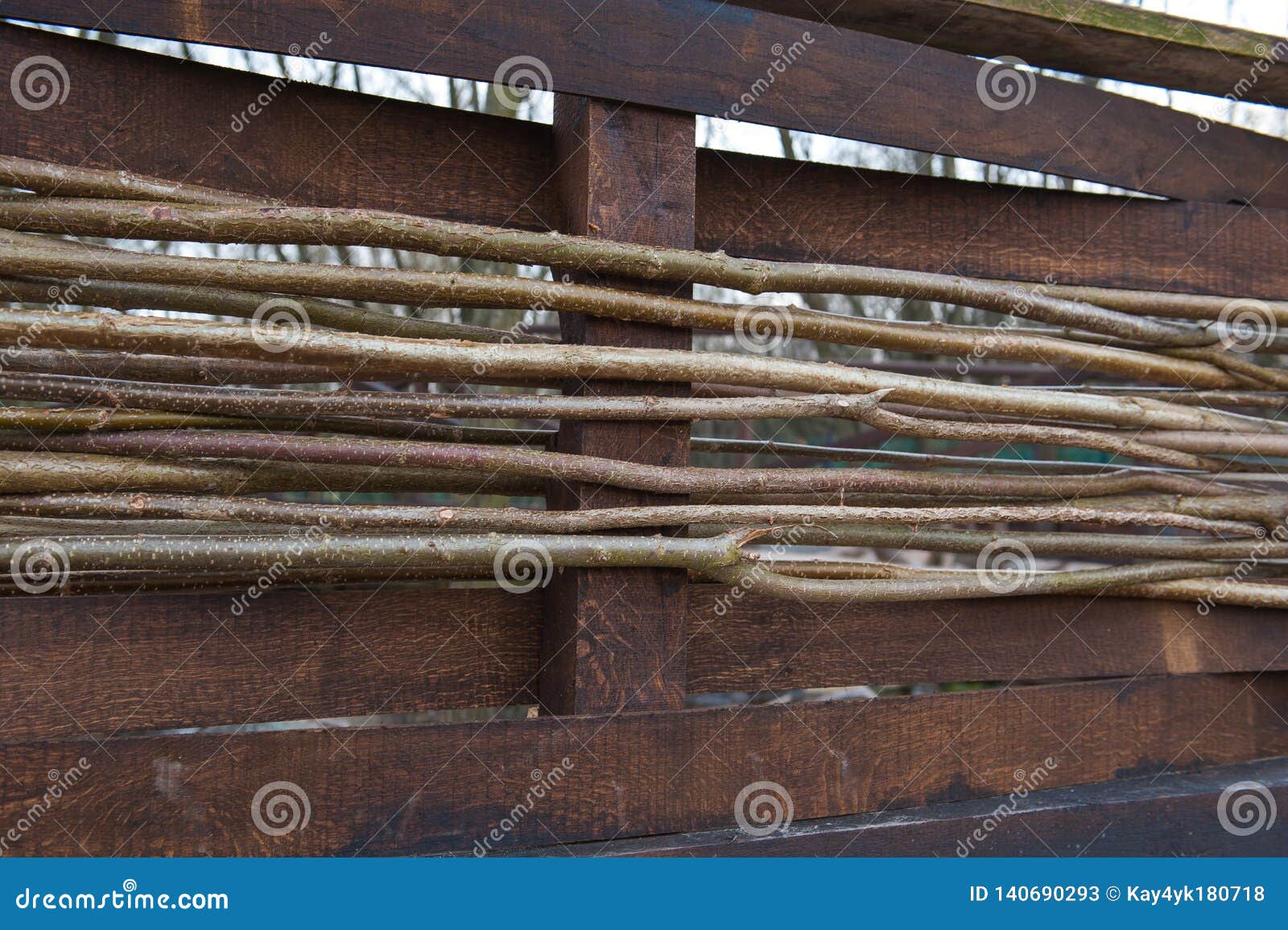 Brown Wooden Fence with Branches, Outdoors in Summer Stock Image ...