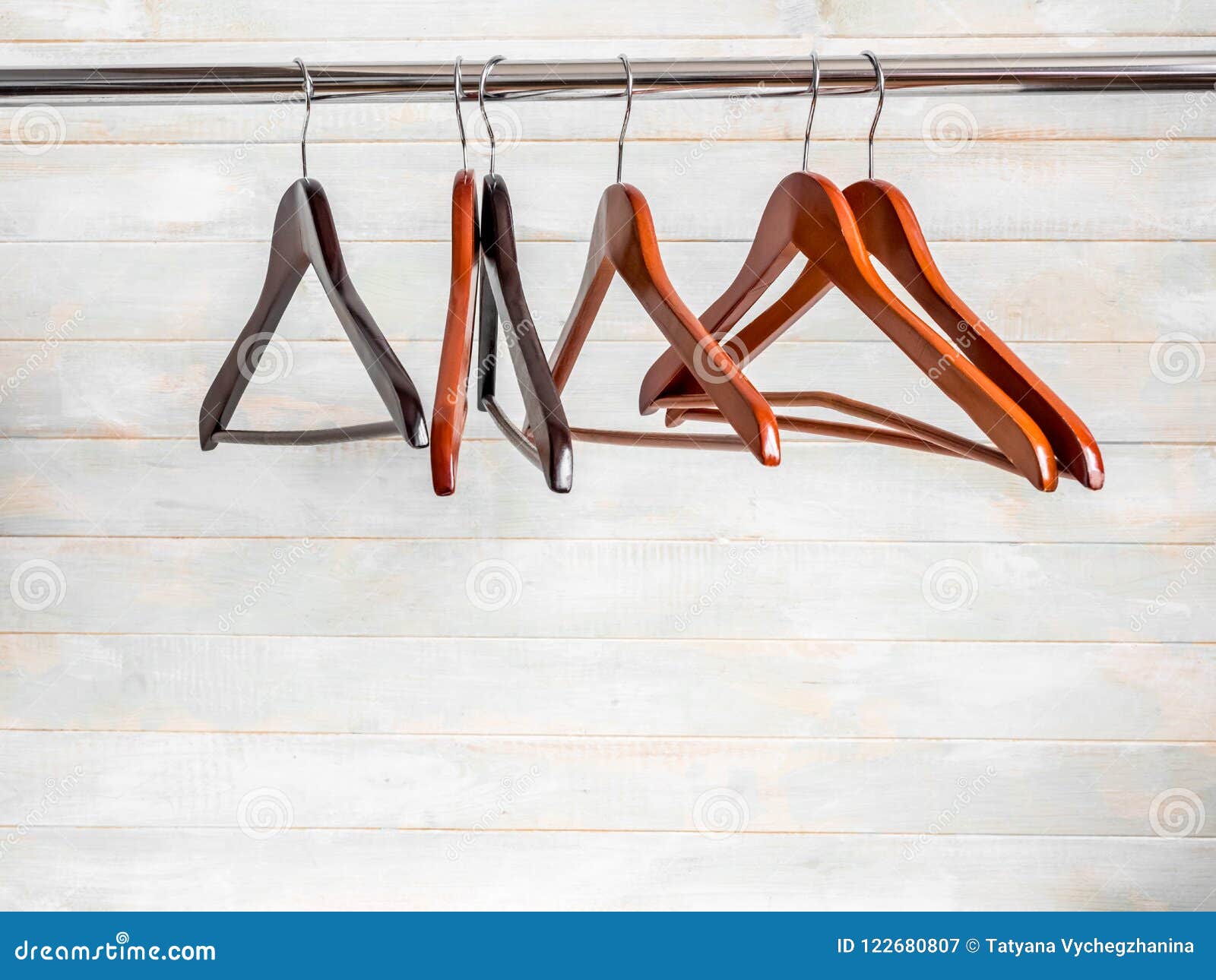 Brown Wooden Hangers on the Rack Stock Image - Image of retail, hanger ...
