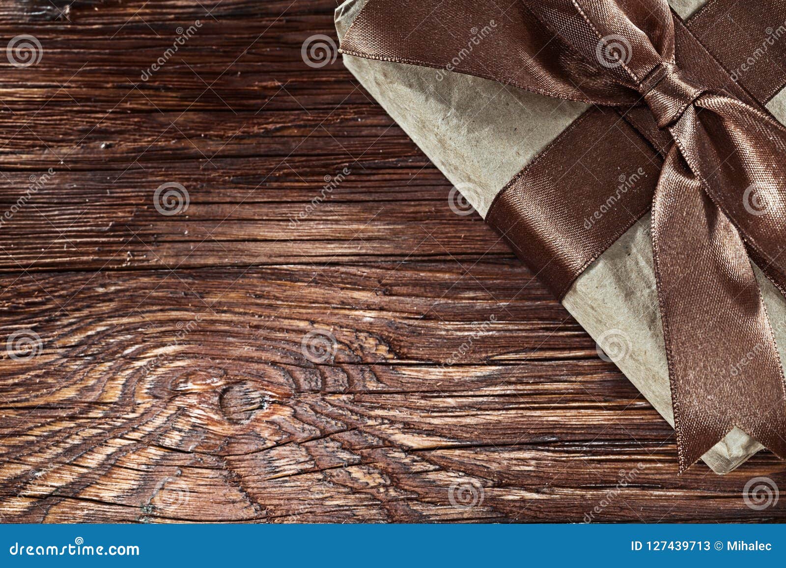 Brown Wrapped Present Box on Vintage Board Stock Image - Image of ...