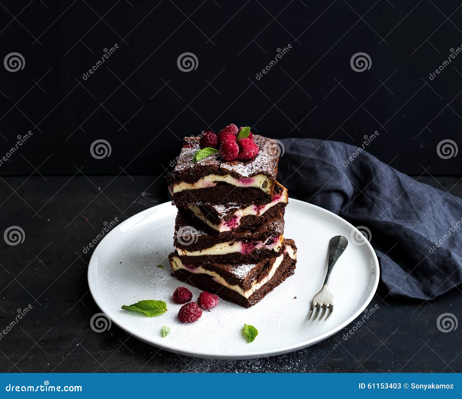 Brownie-cheesecake Tower with Raspberries on White Stock Image - Image ...