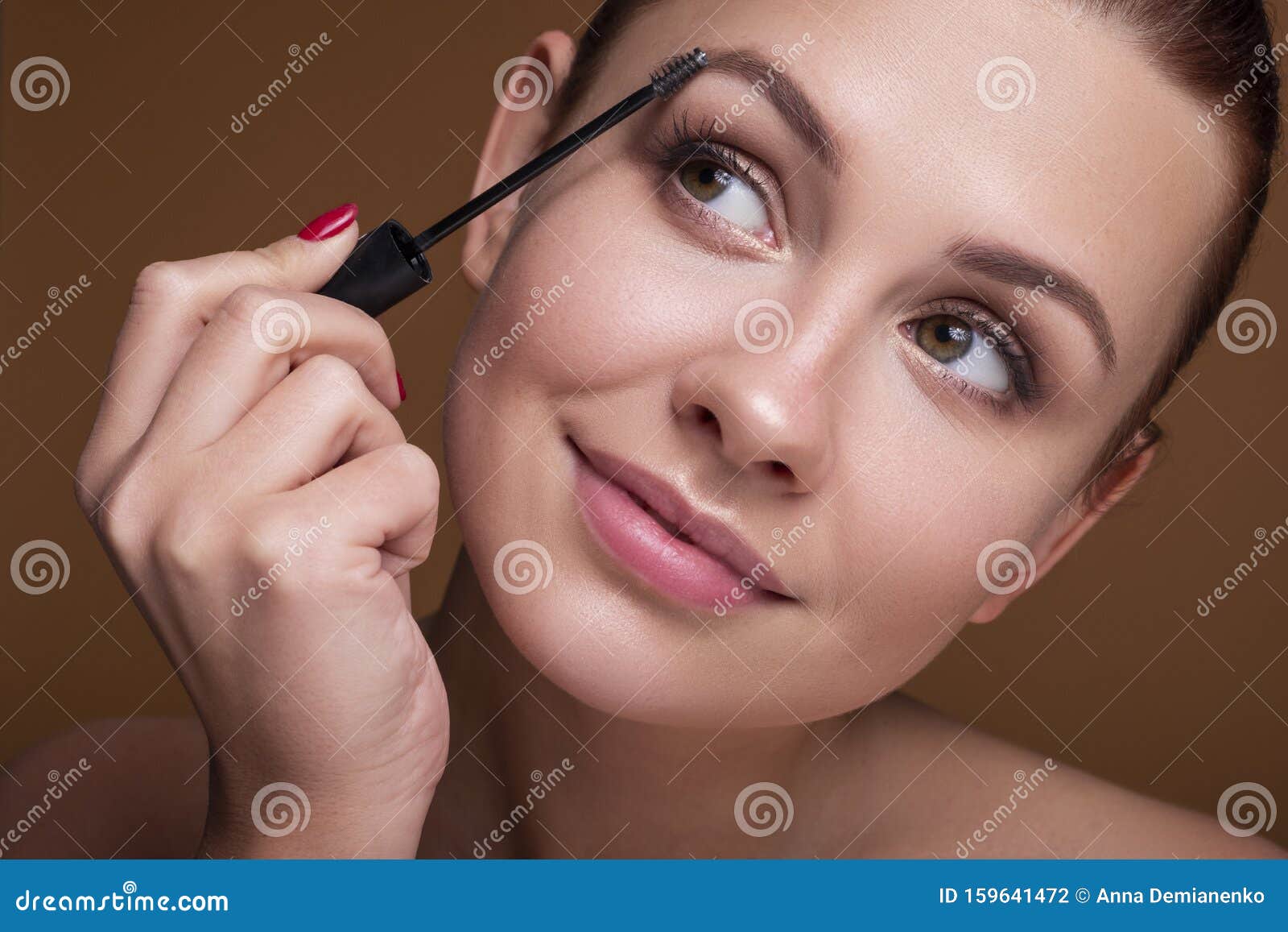 Brunette Caucasian Woman Apply Mascara With A Brush Flawless Clean
