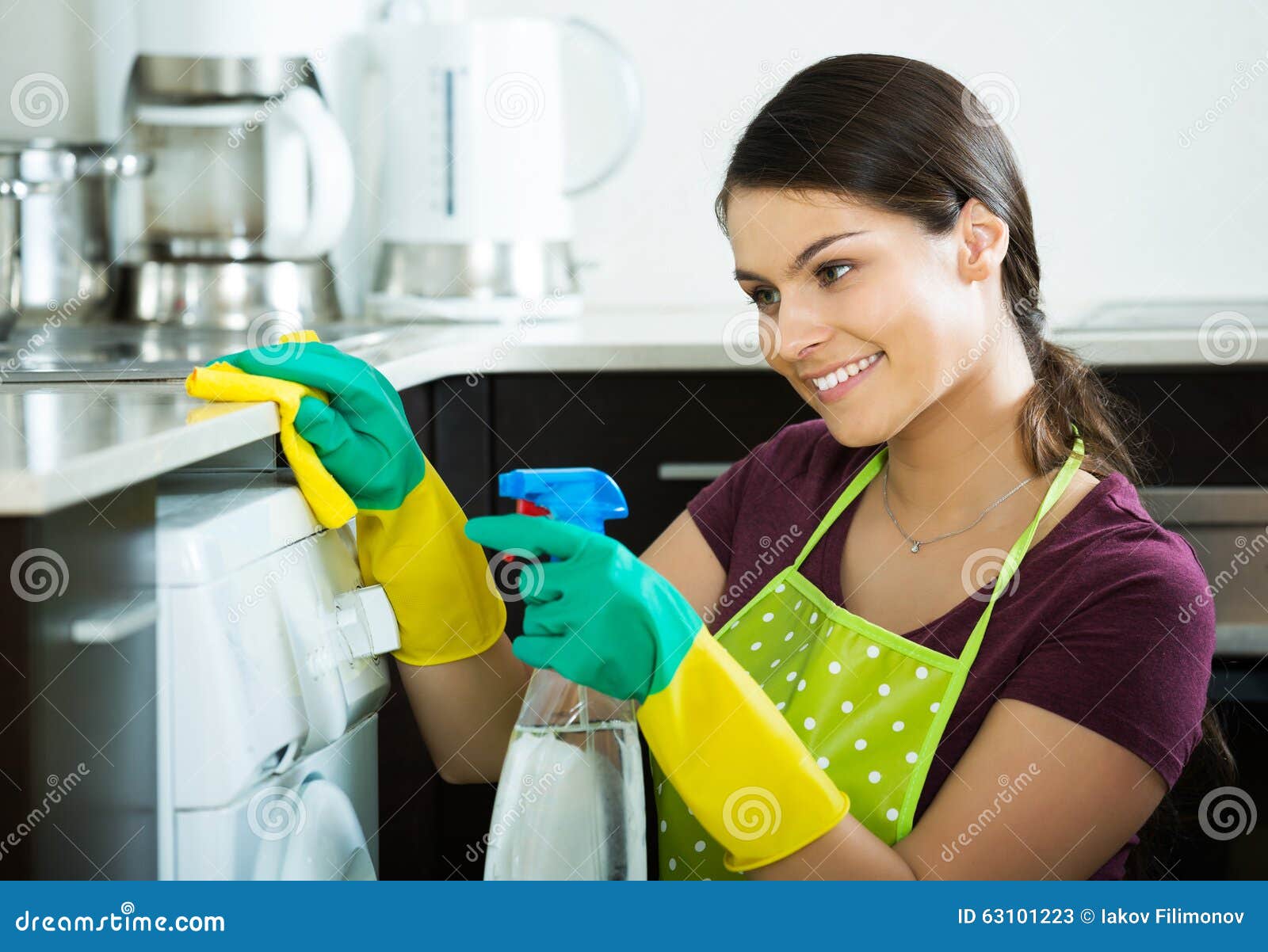Brunette Dusting in Kitchen Stock Image - Image of routine, polish ...