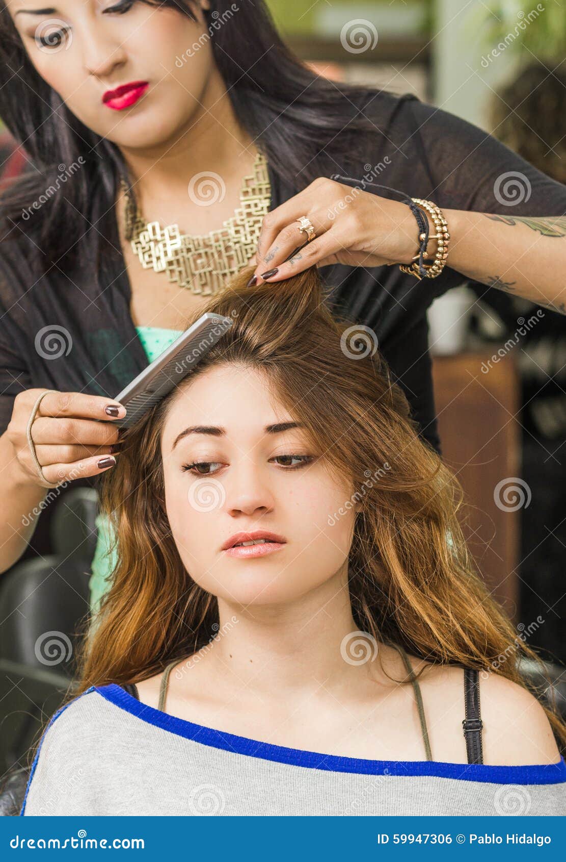 Brunette Facing Camera Getting Hair Done by Stock Photo - Image of ...