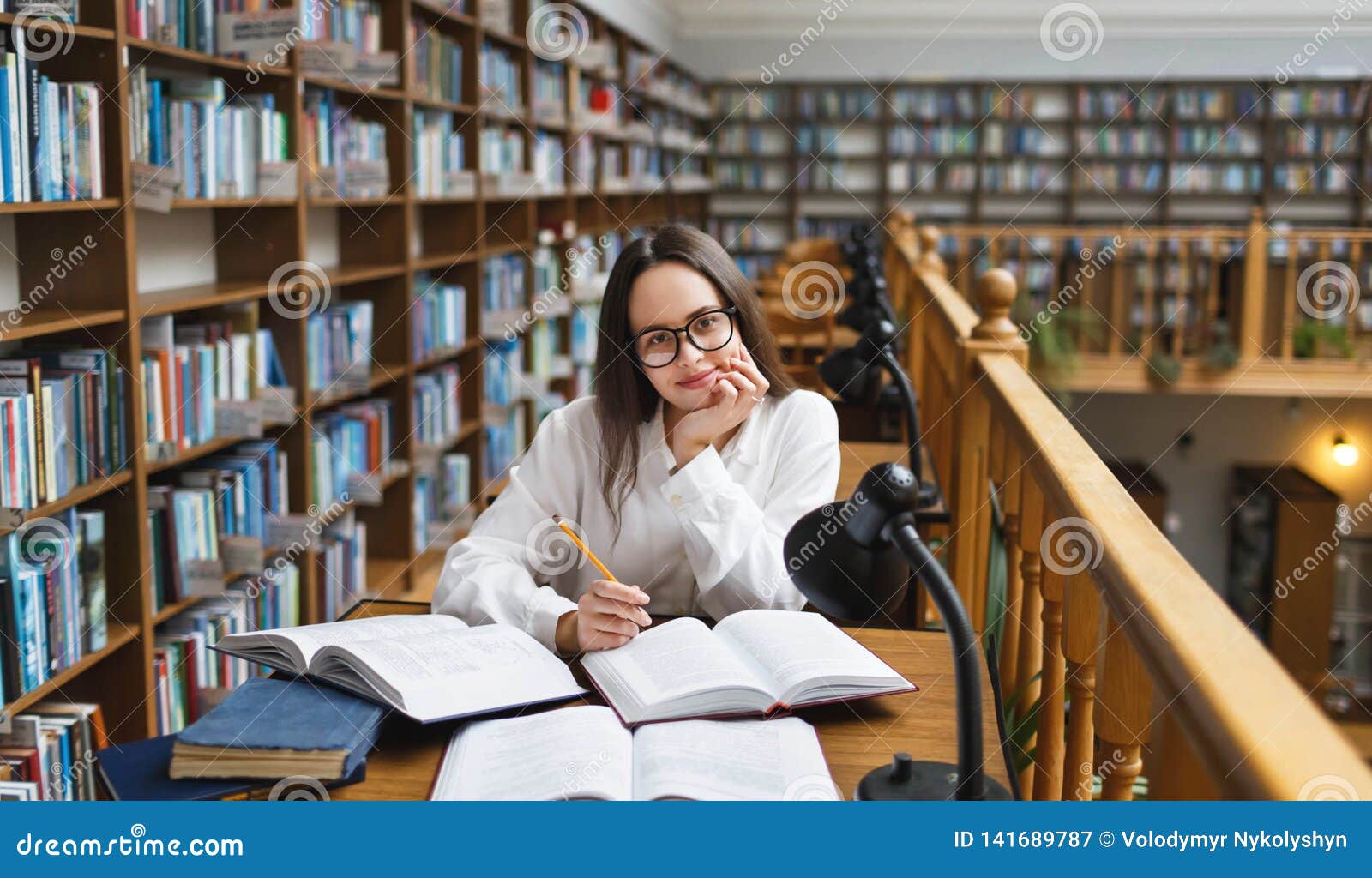 Student Studying at the Library Stock Image - Image of college, reading ...