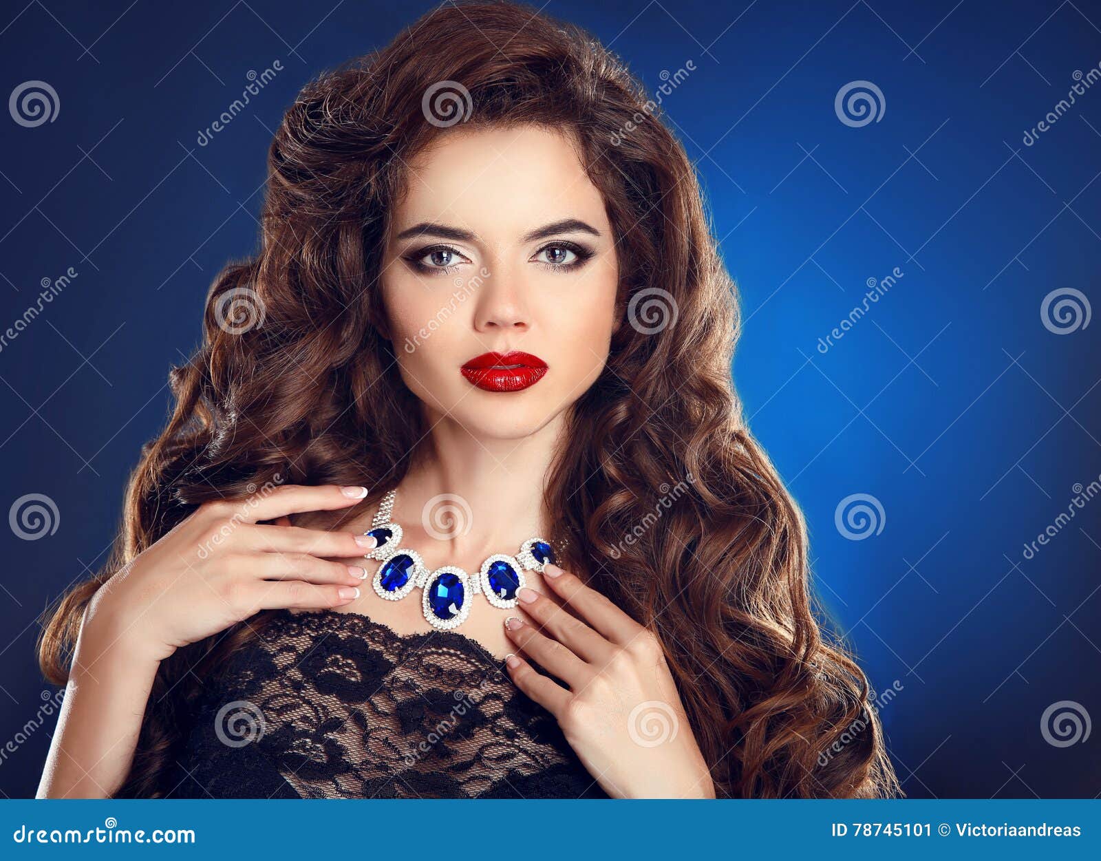 Brunette Girl With Long Shiny Wavy Hair And Red Lips Makeup Fashion