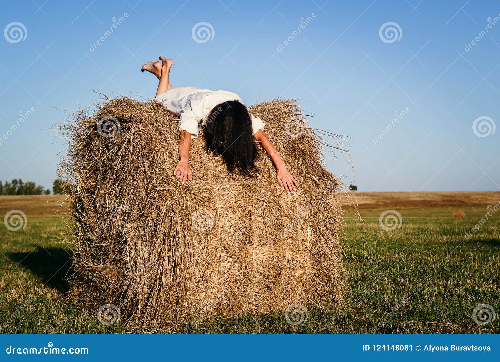 Brunette Girl Lying on a Haystack Stock Image - Image of dreaming ...