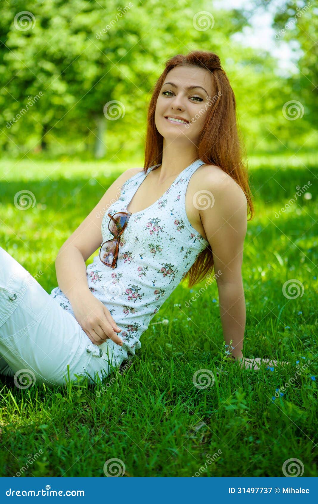 Brunette on green grass stock image. Image of hair, person - 31497737