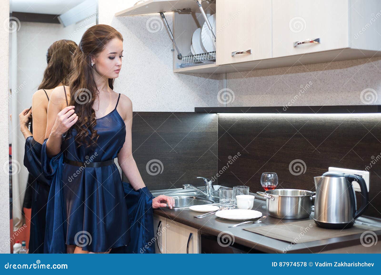 Brunette Housewife in Blue Robe in the Kitchen Stock Photo - Image of ...