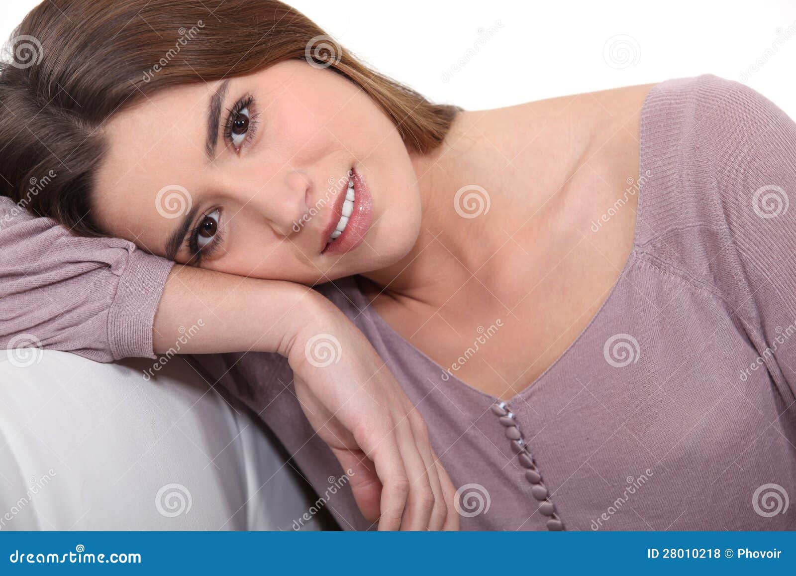 Brunette leaning on sofa stock photo. Image of adult - 28010218