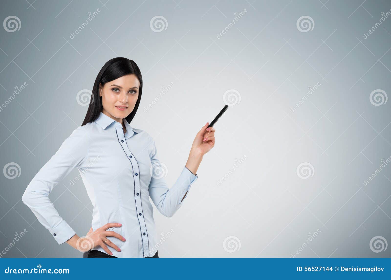 A Brunette is Pointing Out Something. Stock Photo - Image of attractive ...
