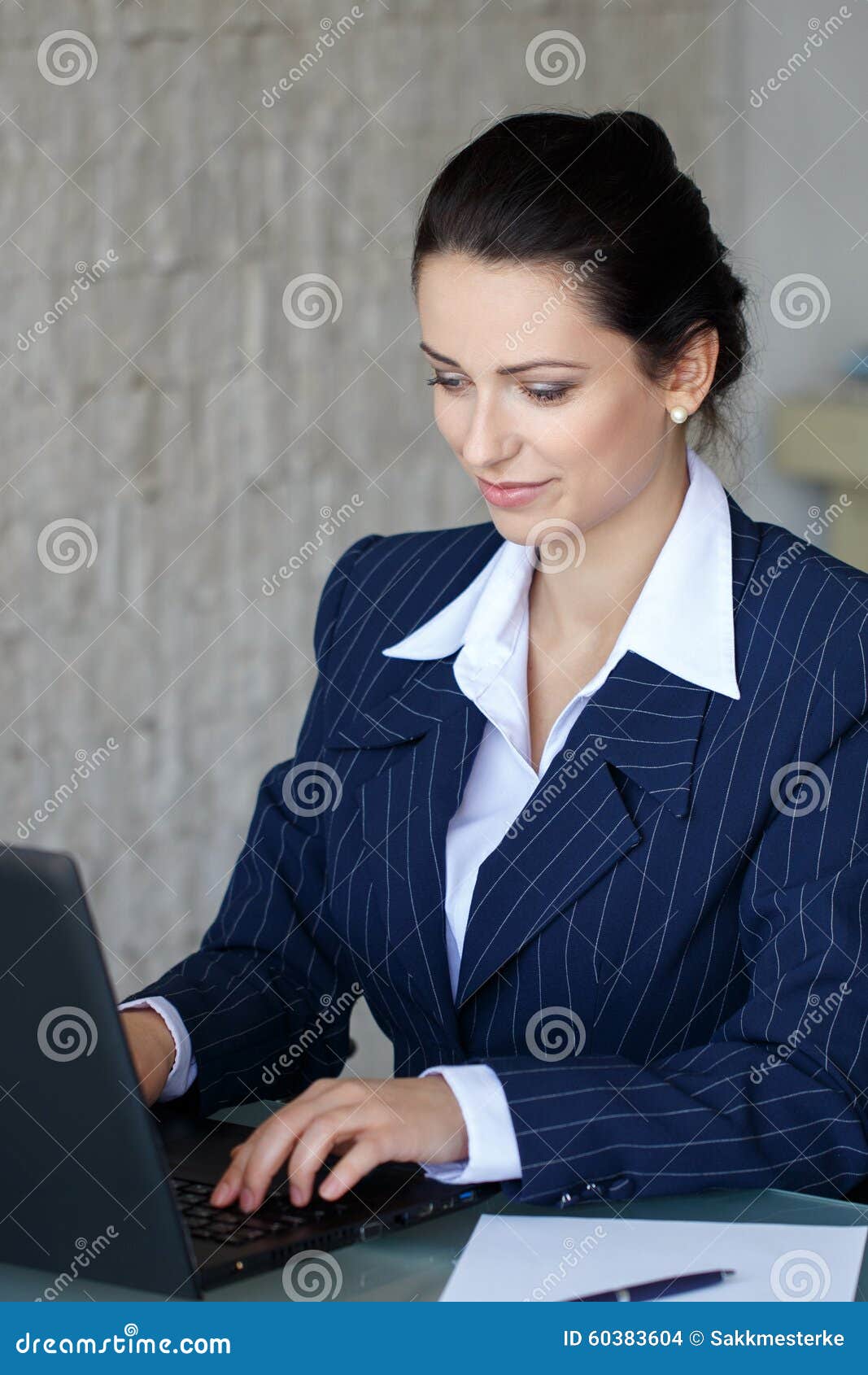 Brunette Secretary Typing Letter on Laptop Stock Photo - Image of ...