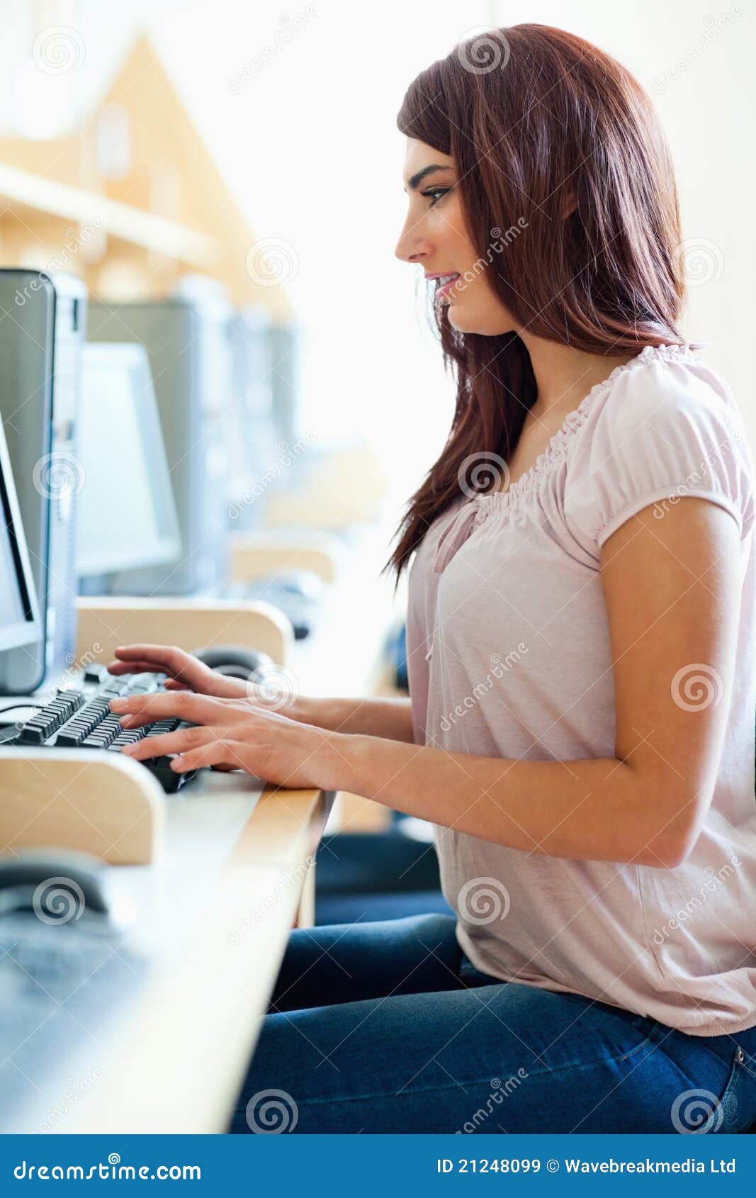 A Brunette Student Working with a Computer Stock Image - Image of ...