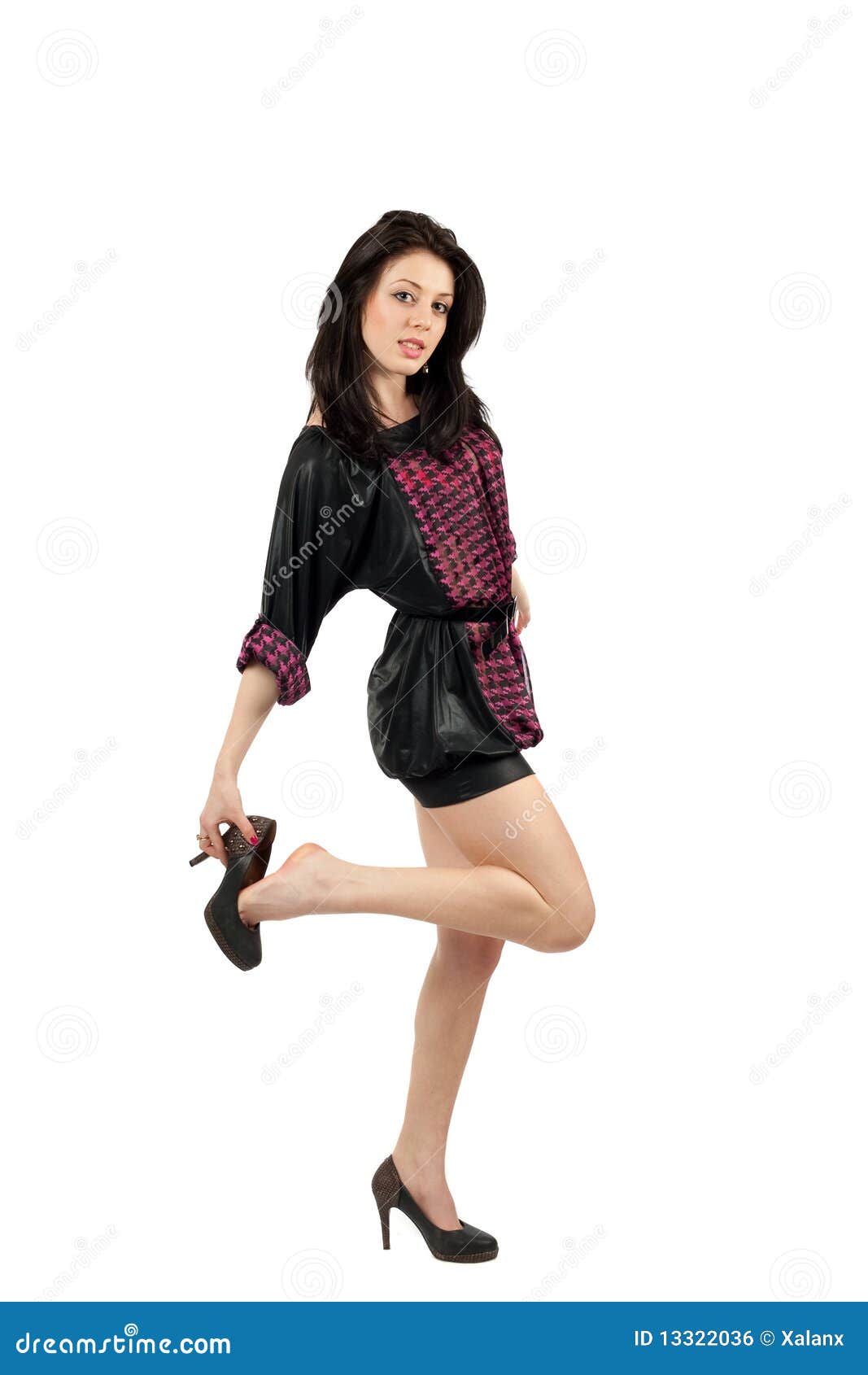 Brunette taking off shoes stock photo. Image of modern - 13322036