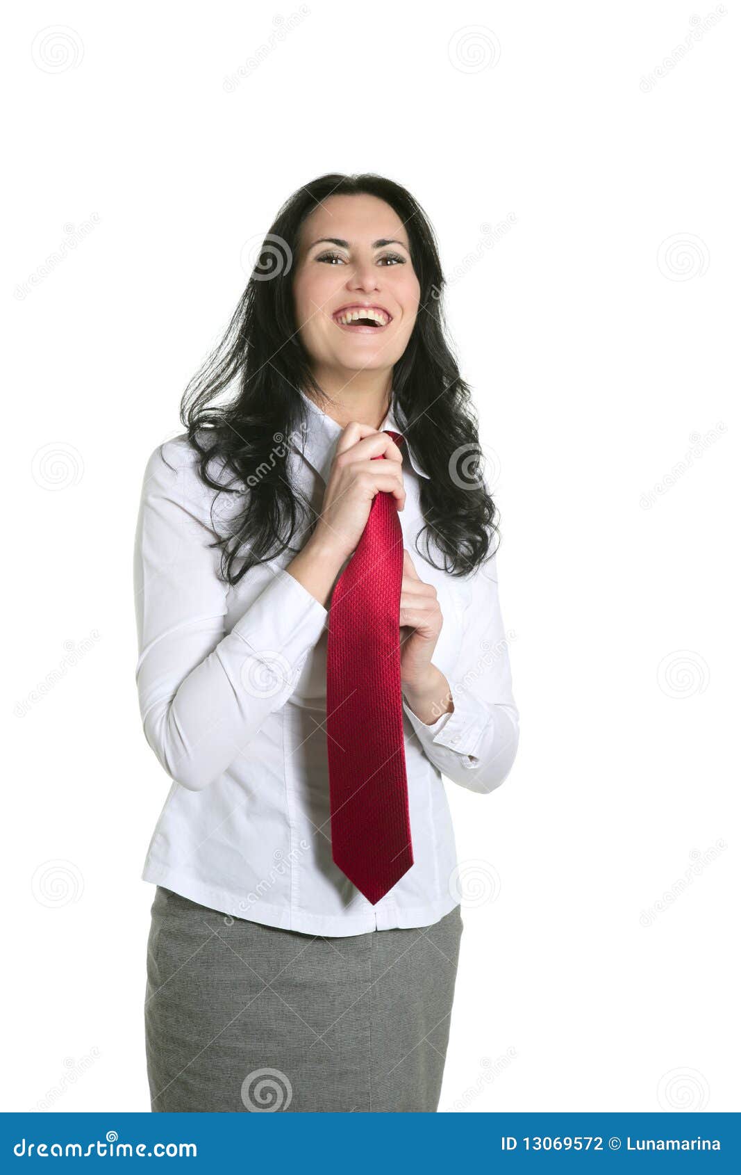 Brunette Woman Adjusting Her Necktie Stock Photo - Image of glamour ...