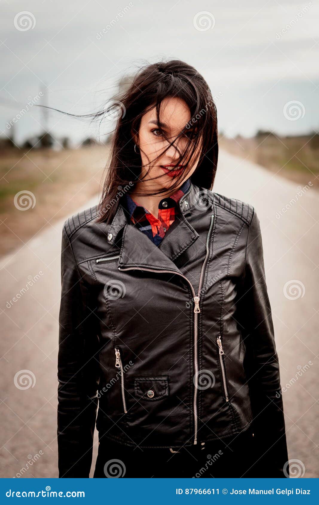 Brunette Woman With Black Leather Jacket In A Road Stock Image Image