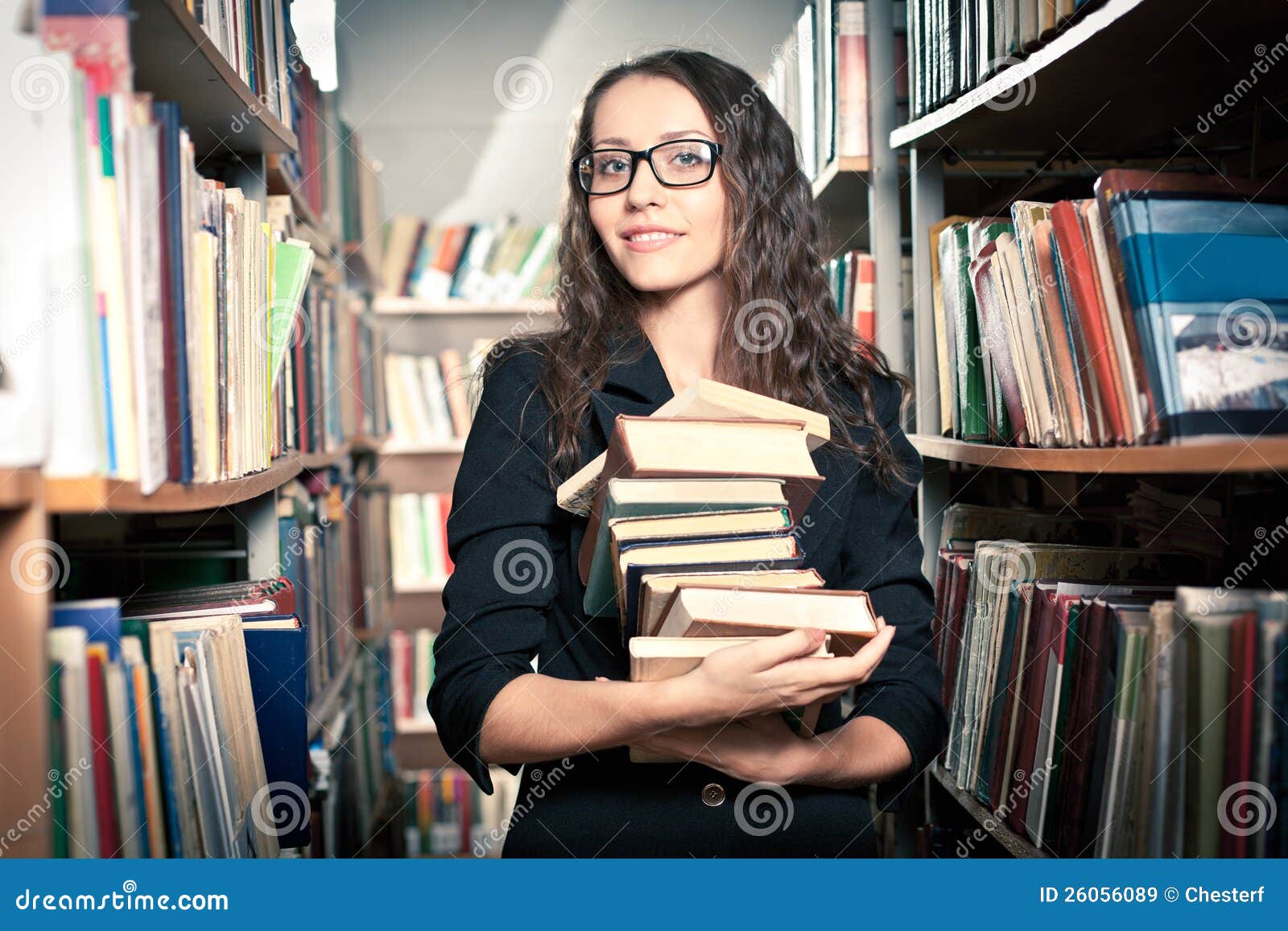 Brunette woman at library stock image. Image of person - 26056089