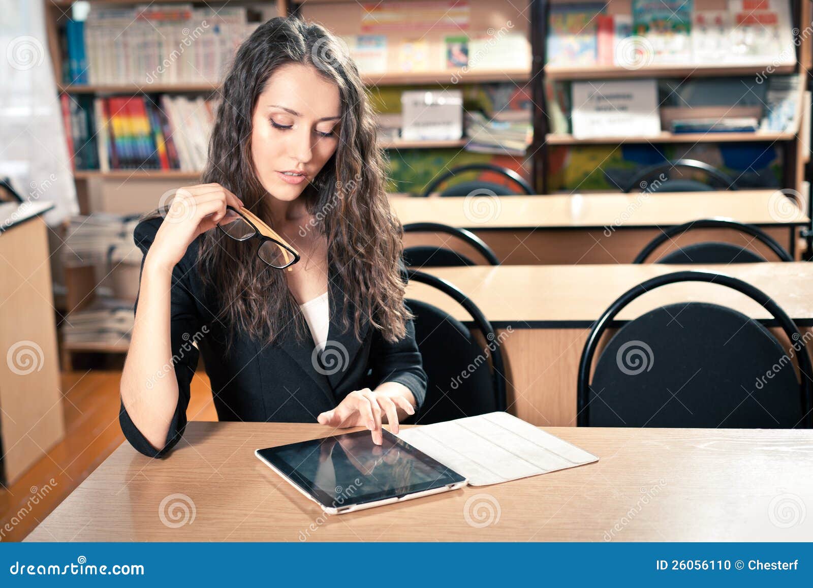 Brunette woman at library stock photo. Image of beauty - 26056110