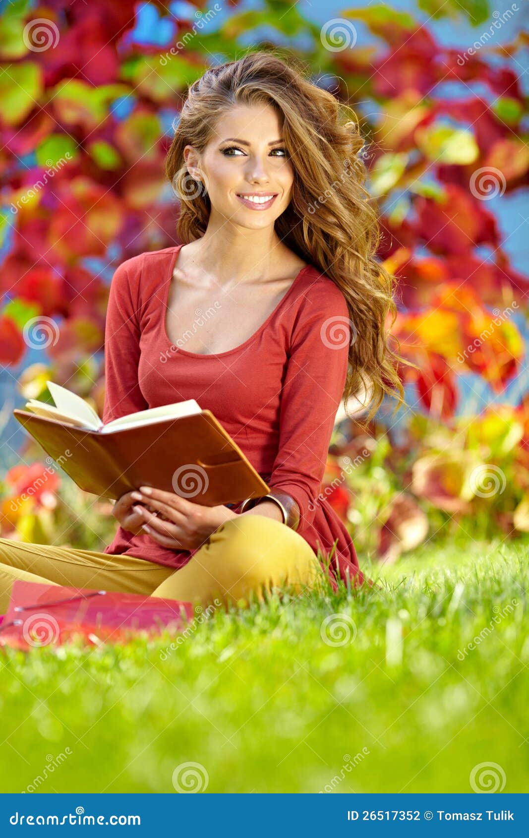 Brunette Woman Reading a Book Stock Photo - Image of relaxed, smiling ...