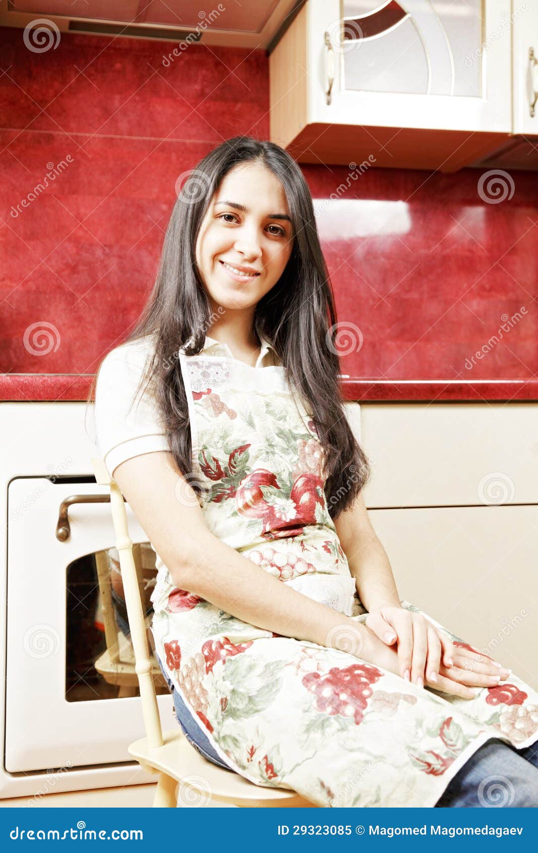 Brunette Woman Sitting in Kitchen Stock Image - Image of kitchen ...