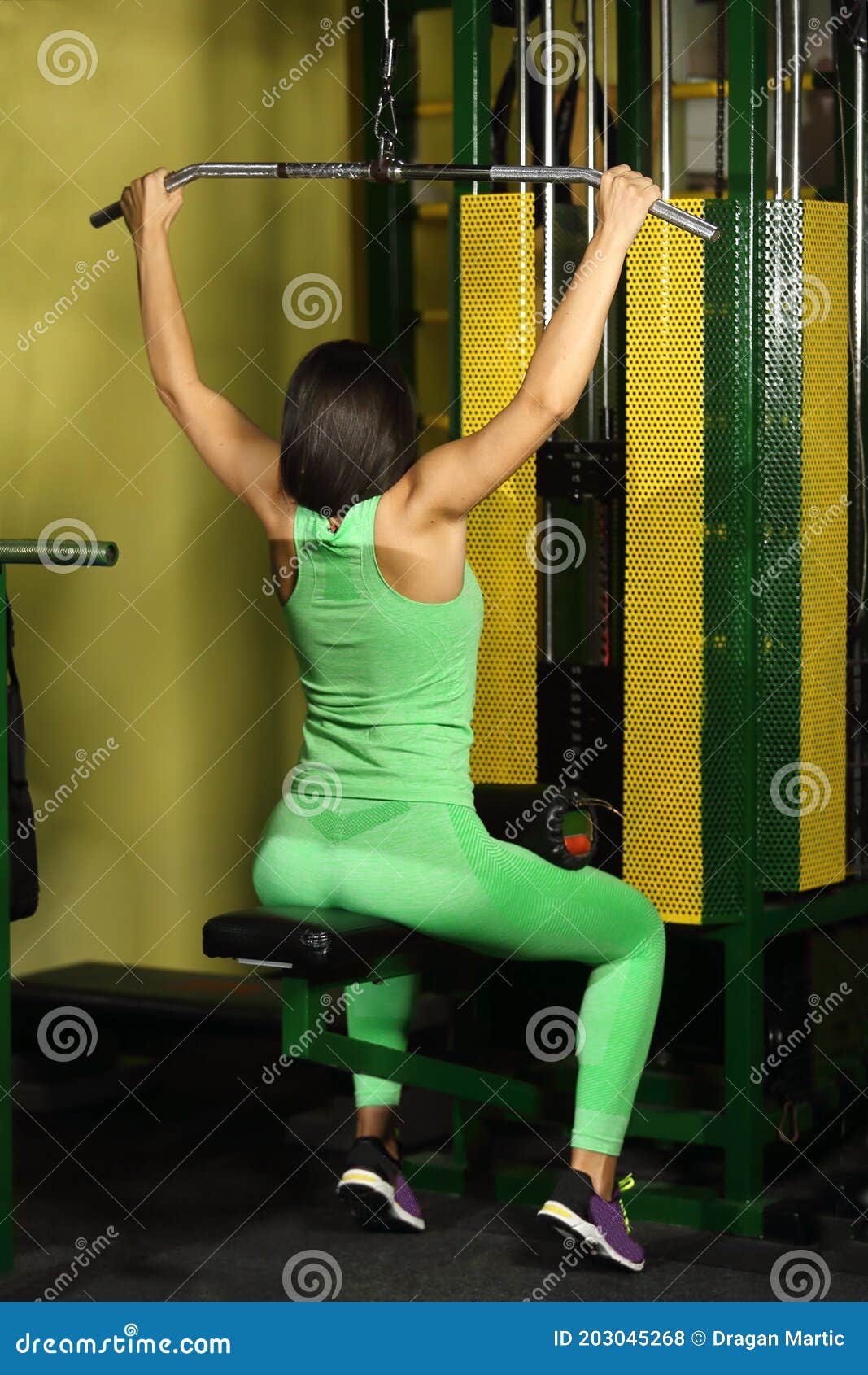 Lat Pulldown Machine Woman Workout at Gym Stock Photo - Image of energy ...