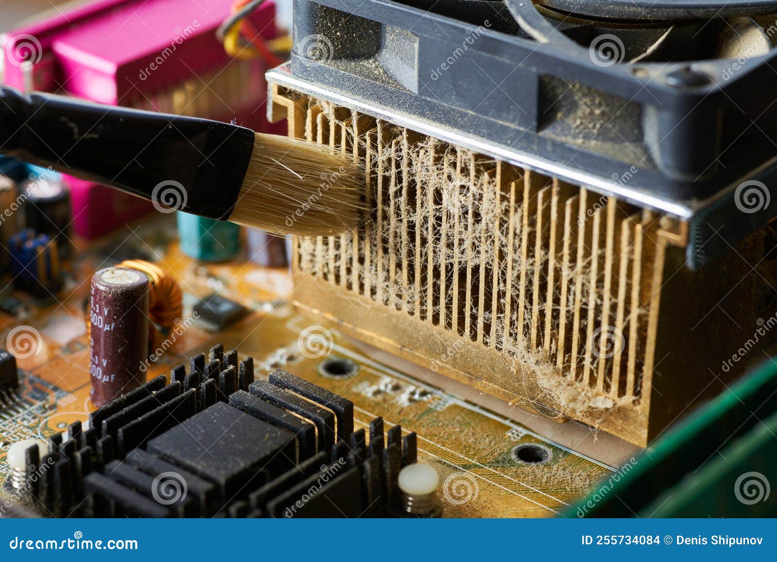 Brush Cleaning an Old Computer Board from Dust and Dirt. Close-up ...