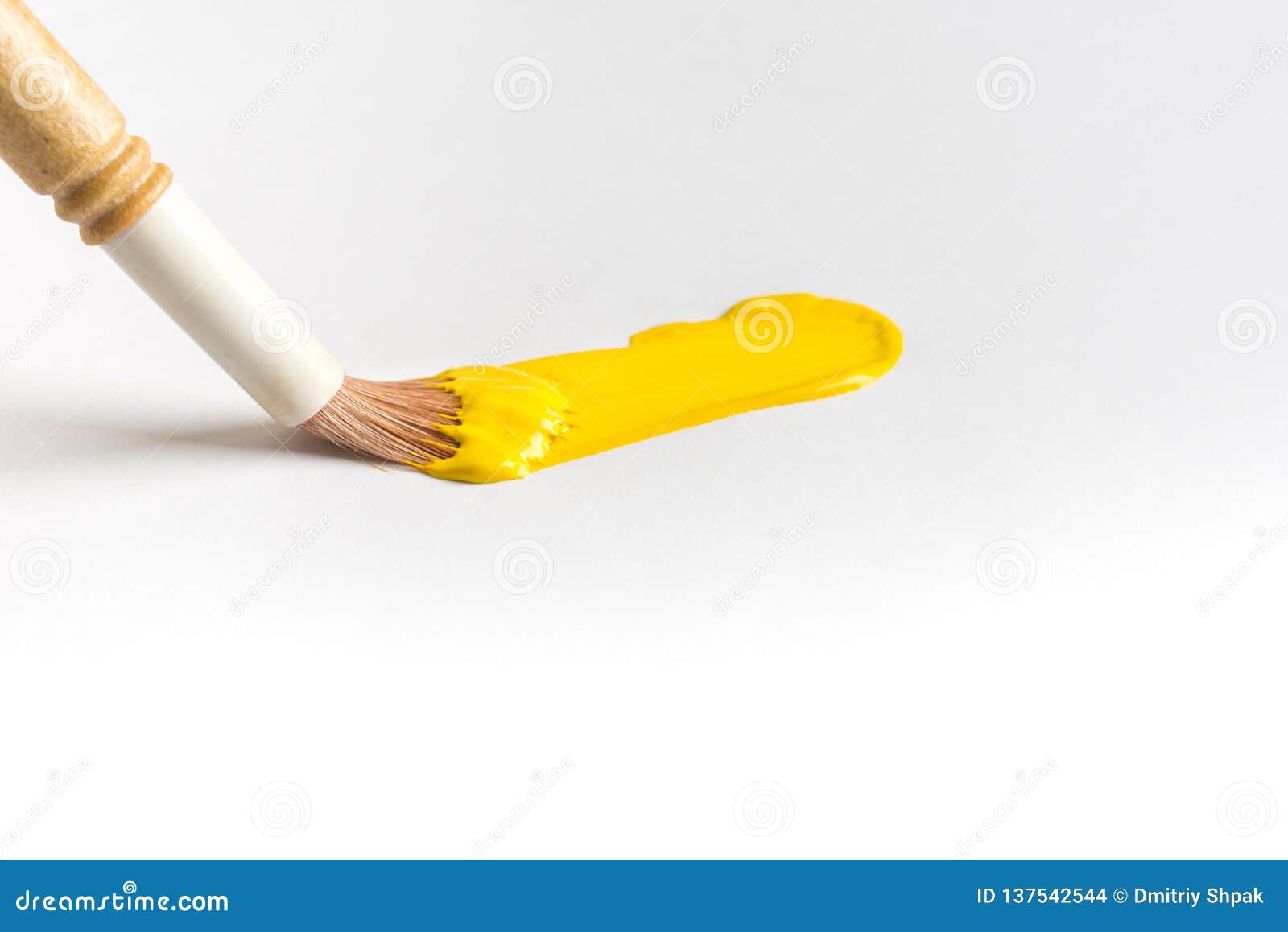 The Brush Draws a Yellow Paint Line Stock Photo - Image of craft ...