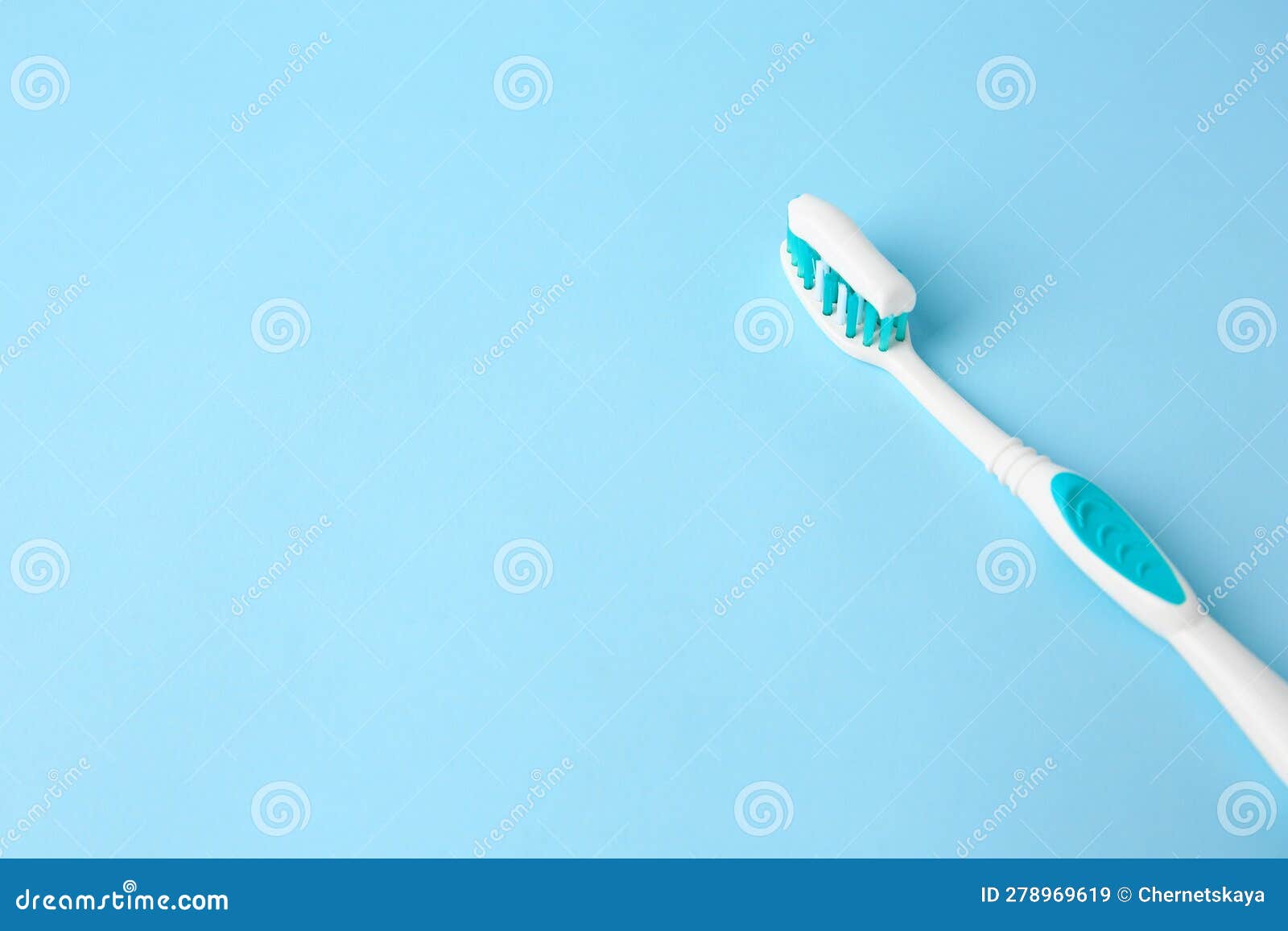 Brush with Toothpaste on Light Blue Background, Space for Text Stock ...