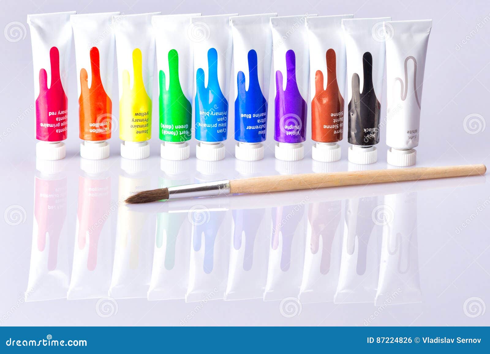 Brush Tubes Lies on the Background with Paints Stock Photo - Image of ...