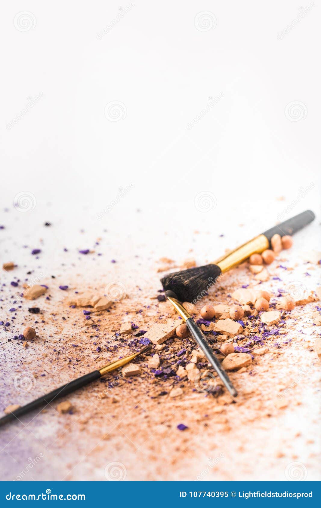 Brushes Lying on White Surface Spilled with Cosmetic Powder Stock Image ...