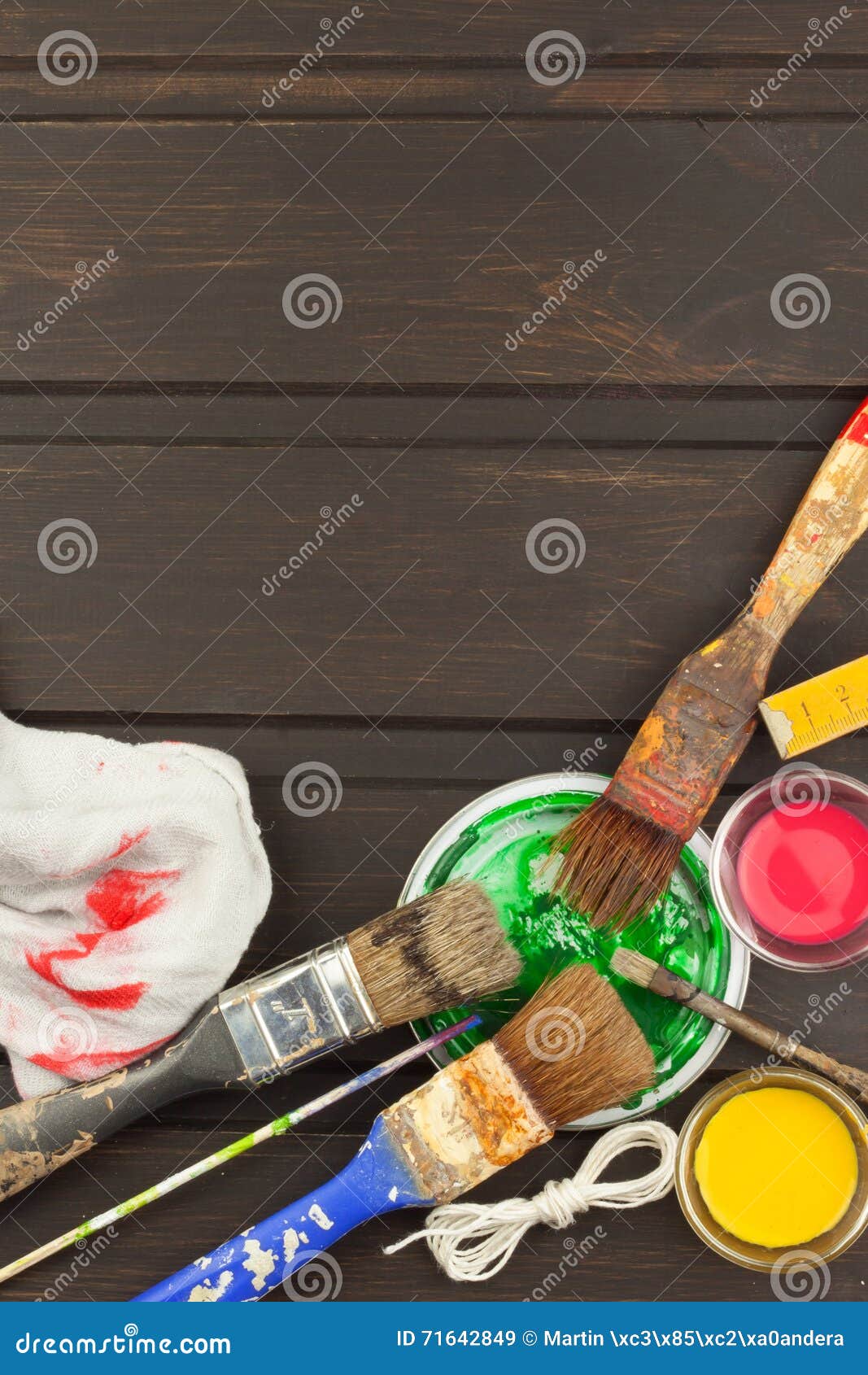 Brushes and Paint on a Wooden Table. Painter Tools. Workshop Painter ...
