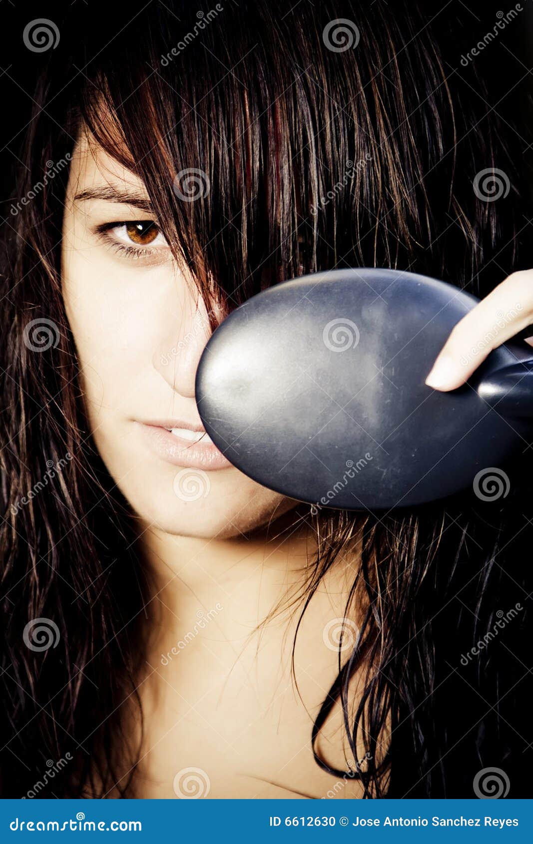 Brushing her hair stock photo. Image of serious, styling - 6612630