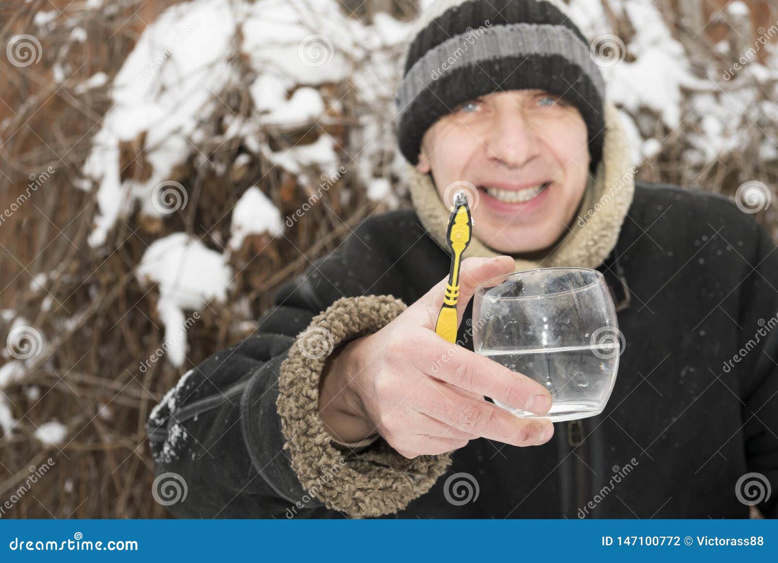 Brushing teeth in winter stock photo. Image of snow - 147100772