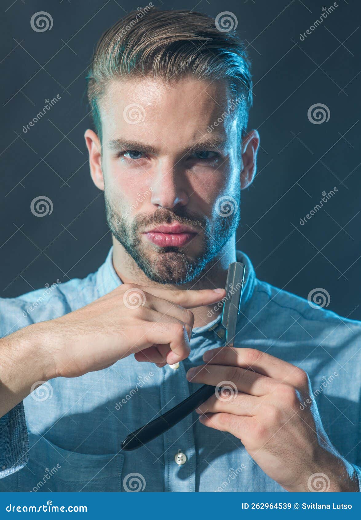 Brutal Bearded Man In Stylish Shirt With Straight Razor Sharp Blade