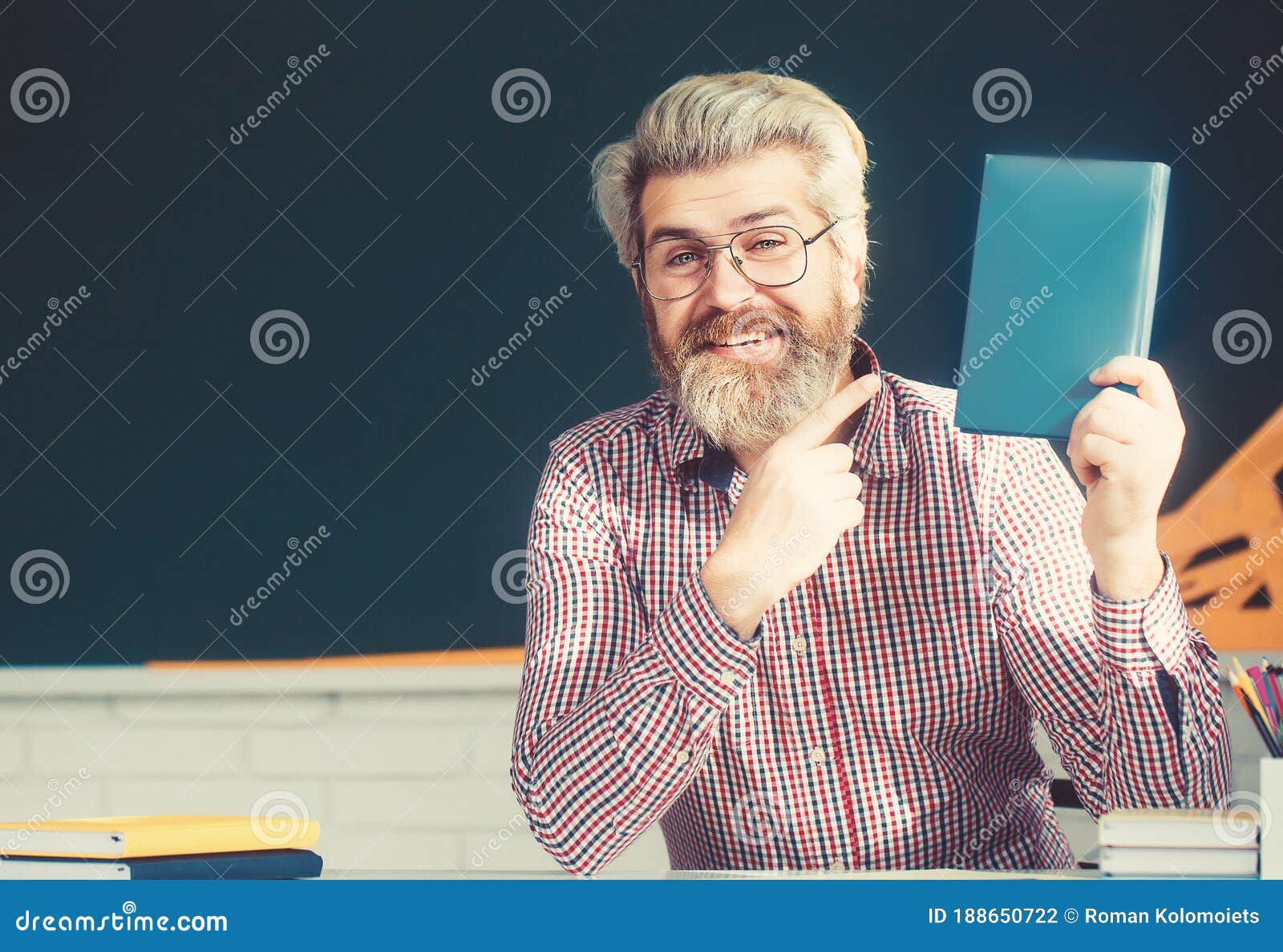 Brutal Bearded Teacher Smiling at Camera at Back of Classroom at the ...
