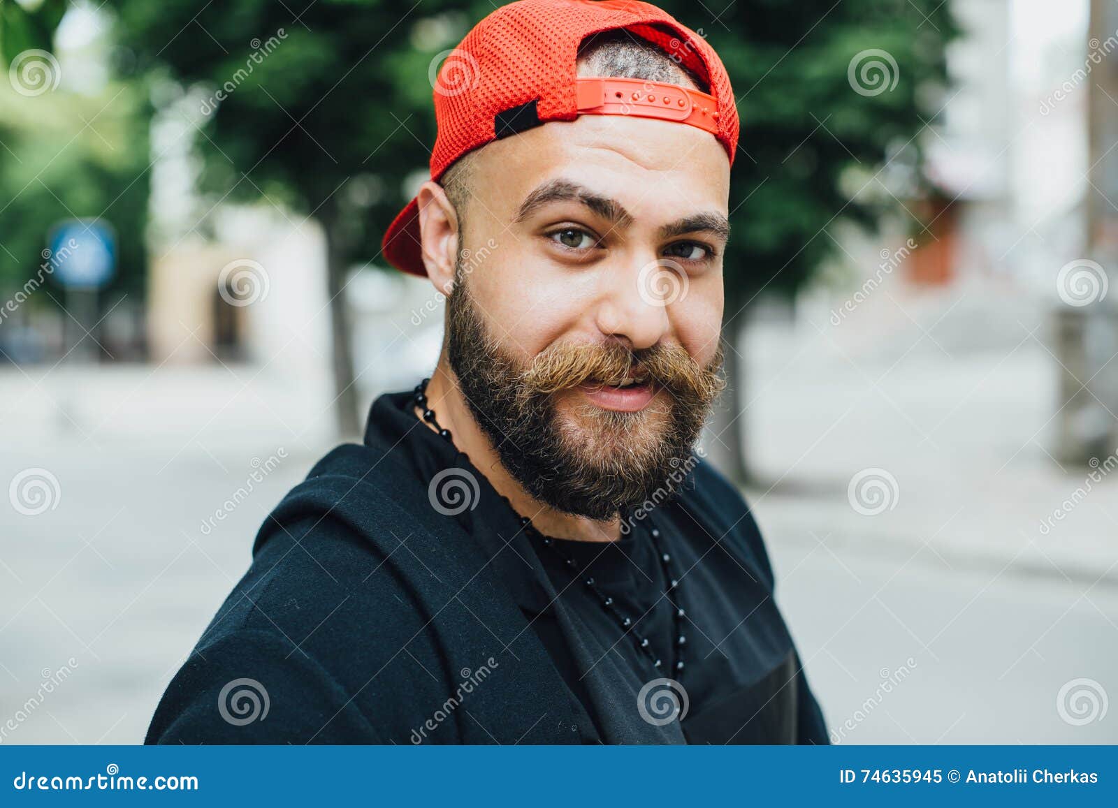 Man With Beard, Biker In Leather Jacket Lean On Motor Bike In Darkness ...