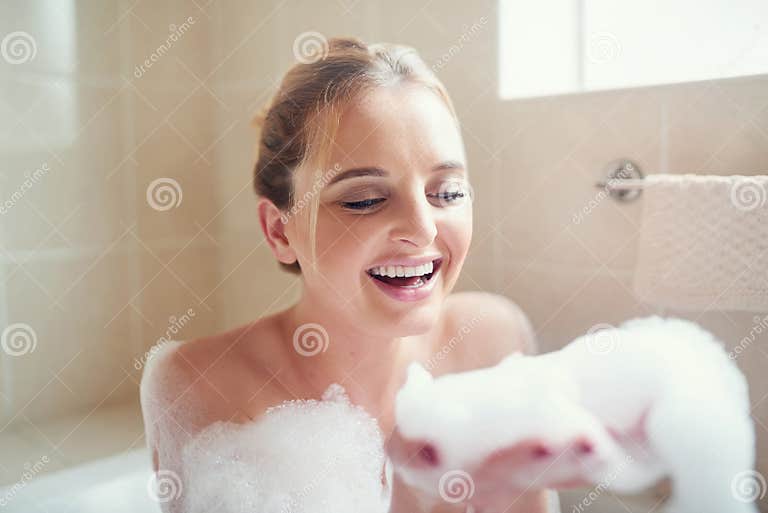 Bubble Baths Are My Perfect Kind Of Stress Reliever An Attractive Young Woman Relaxing In The