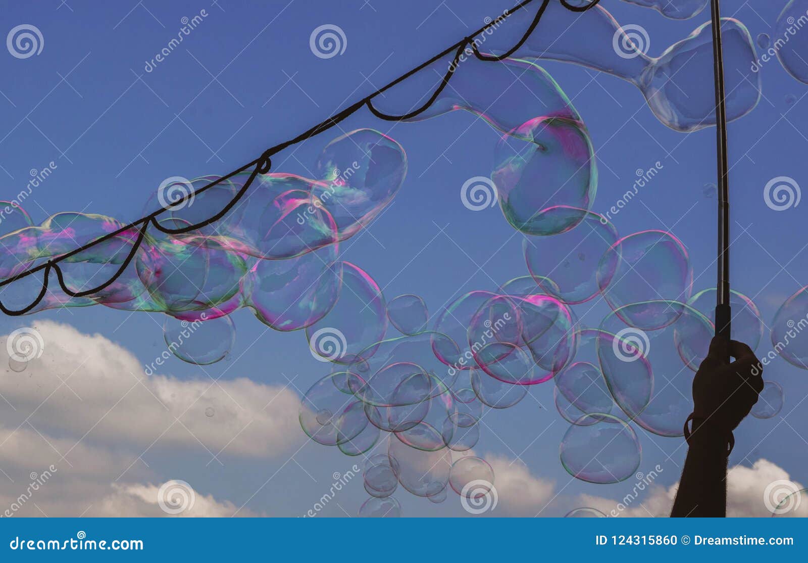 Bubble blowing in the air. stock photo. Image of bubble - 124315860