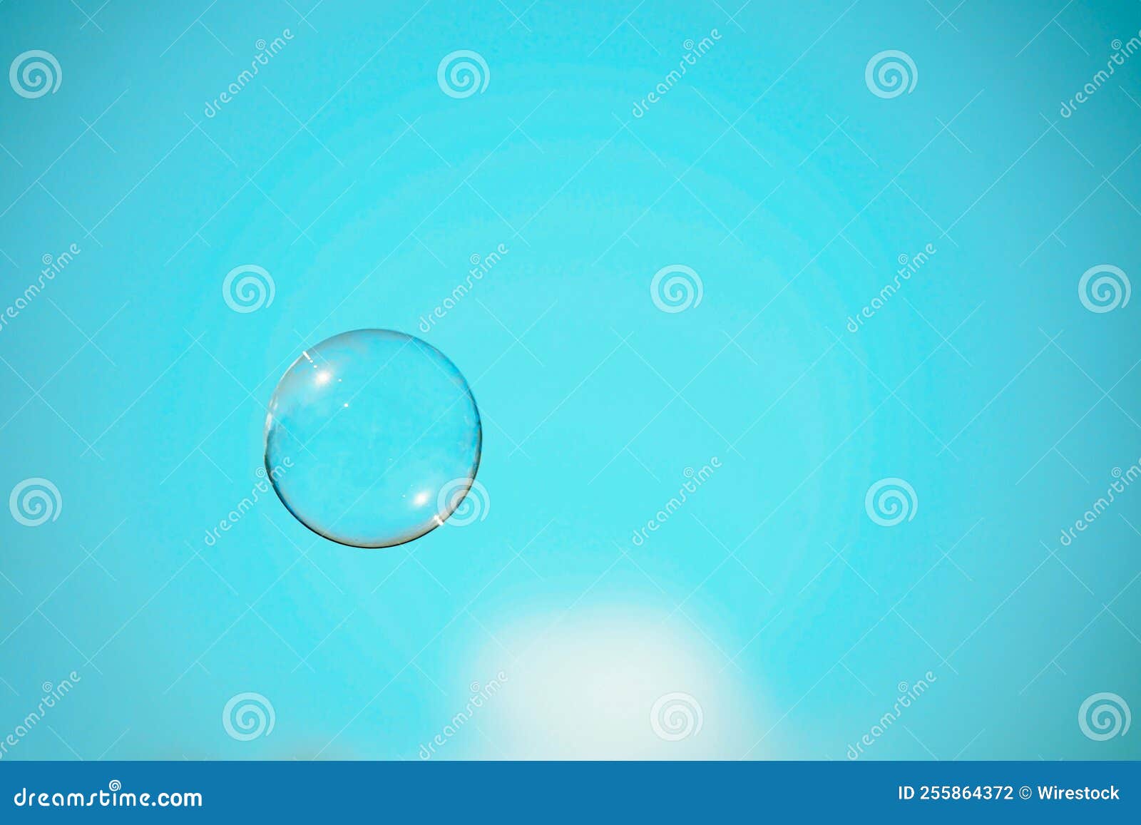Bubble Floating through Air Over a Background of a Blue Sunny Sky Stock ...